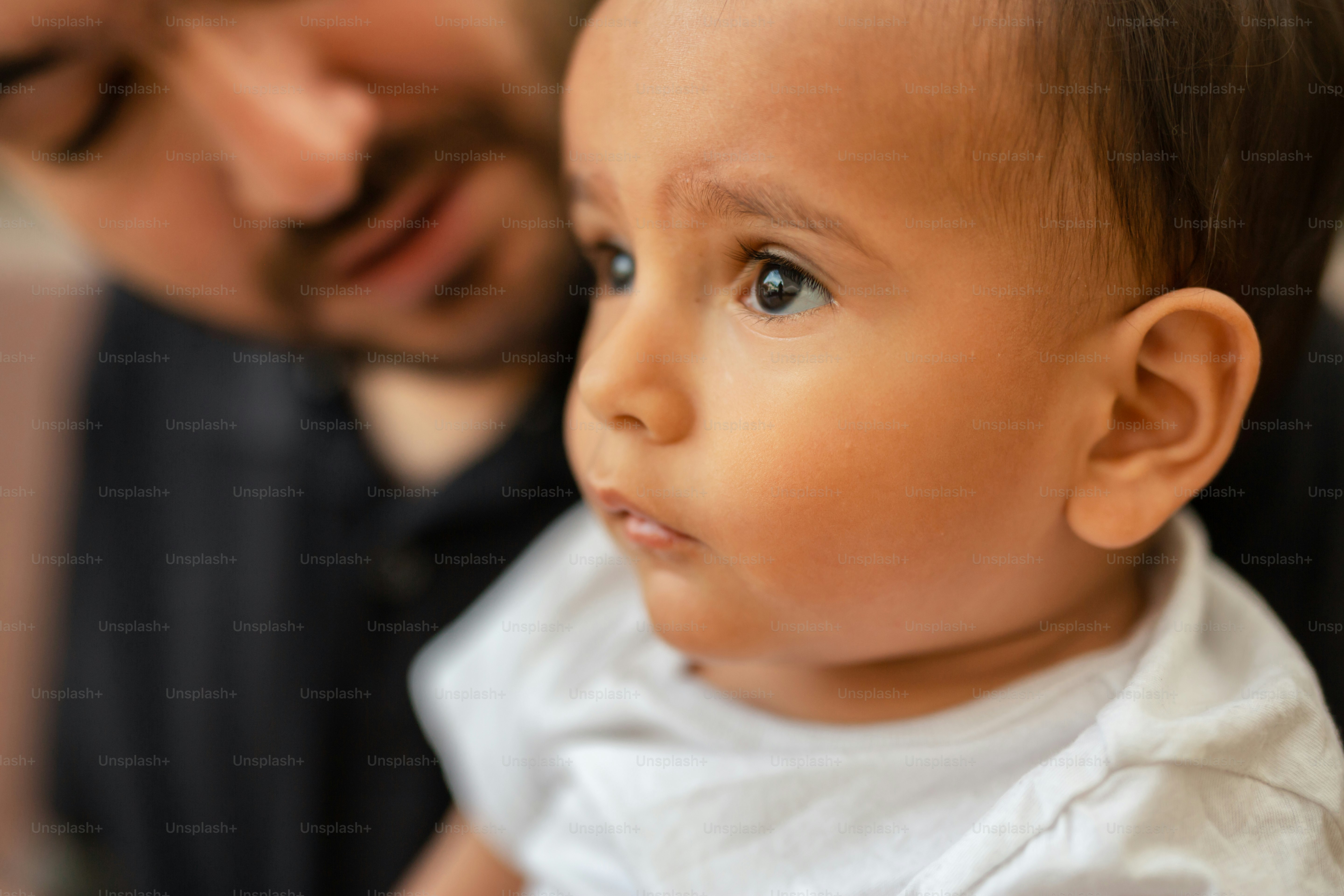 A man and a little boy standing next to a motorcycle photo – Dad Image ...