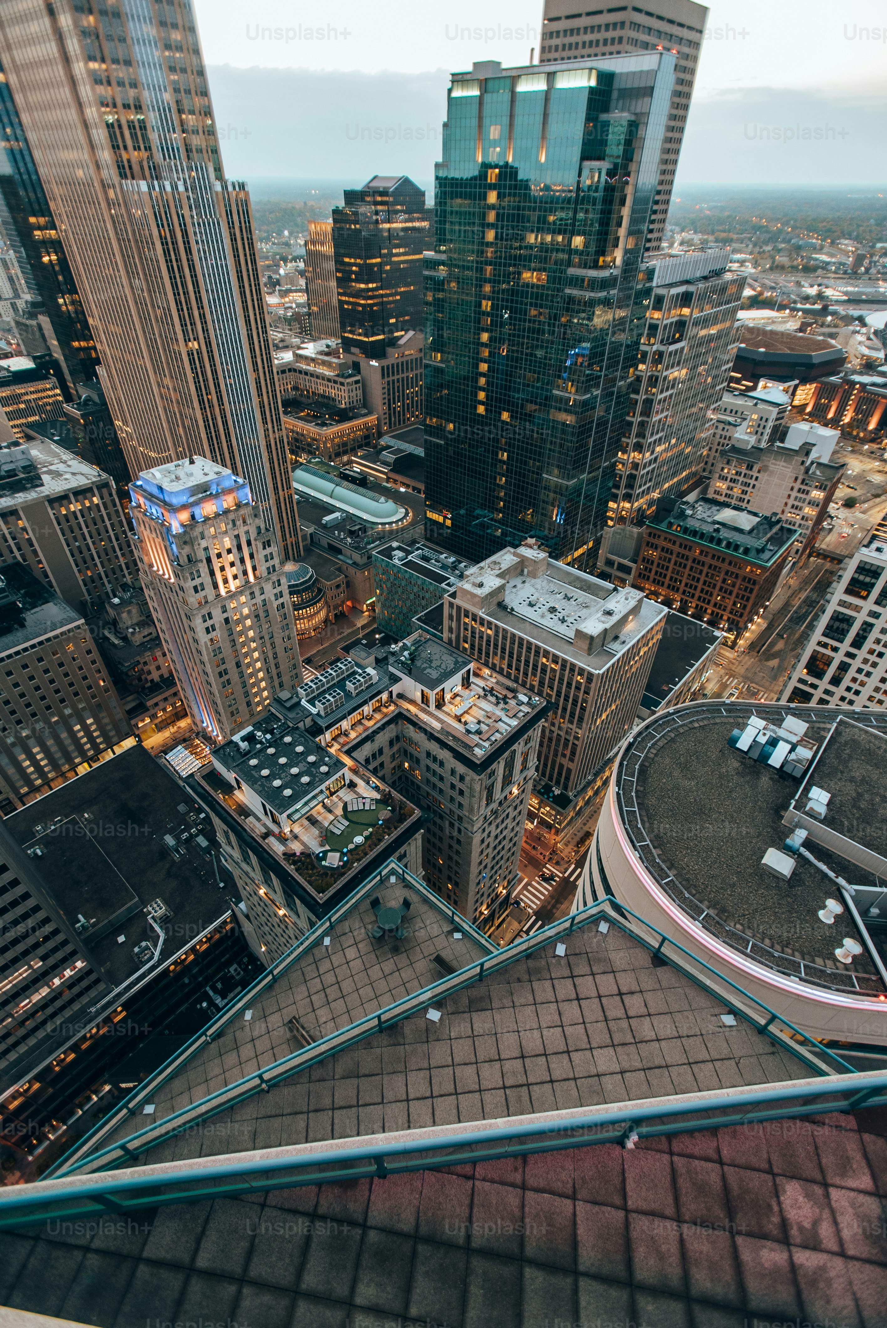 A view of a city from the top of a building photo – Skyscrapers Image ...