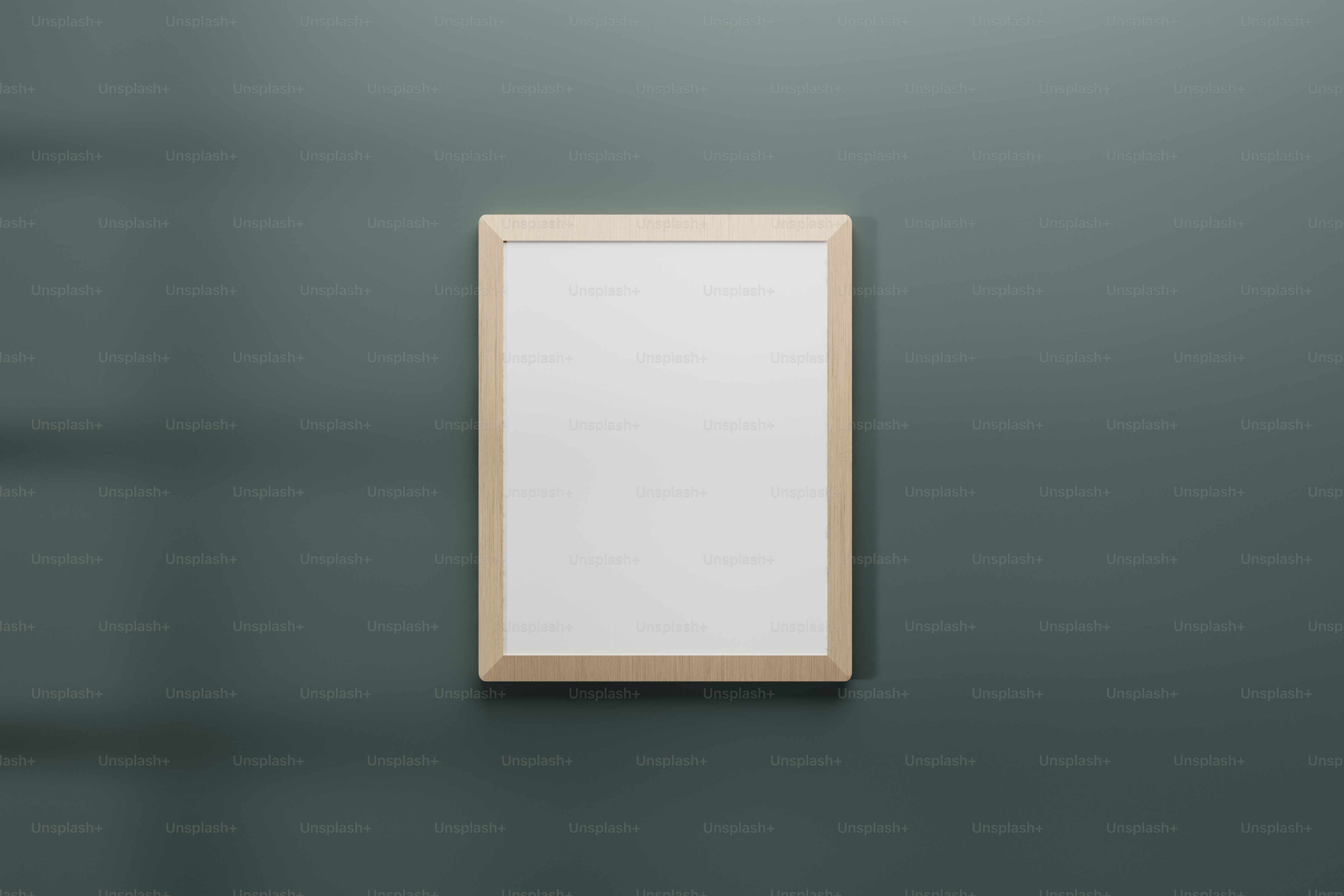 A black room with three white frames on the wall photo – Art Image on ...