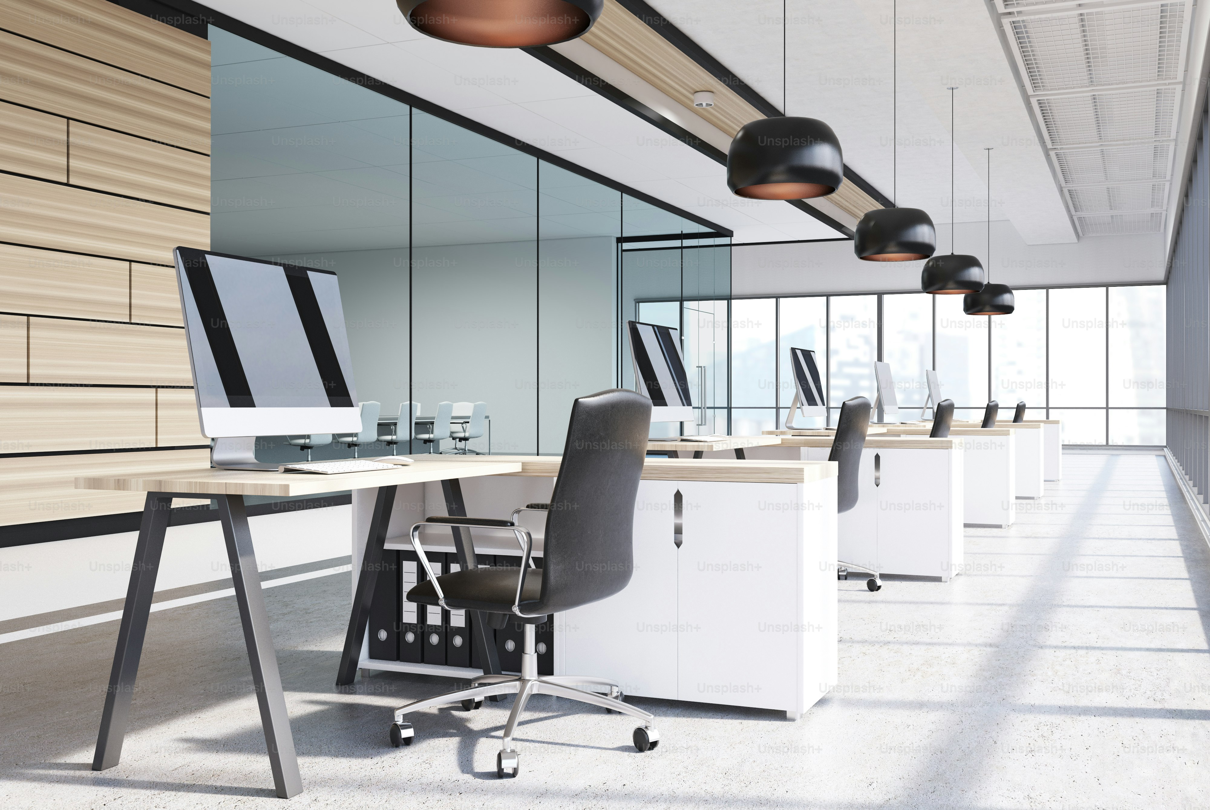Wooden open office interior with a row of wooden tables, computers on ...