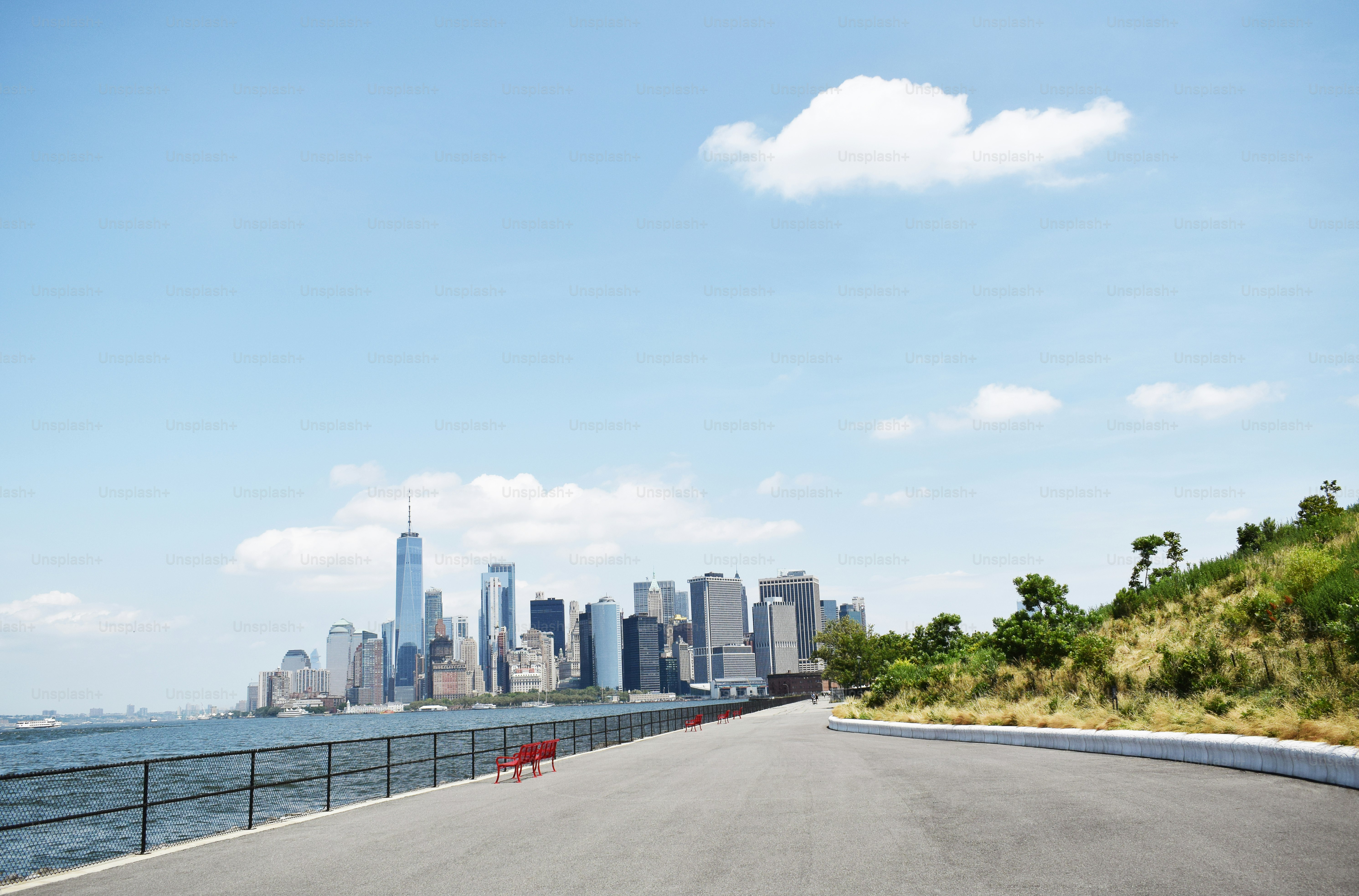 A view of a city skyline from a road photo – Architecture Image on Unsplash