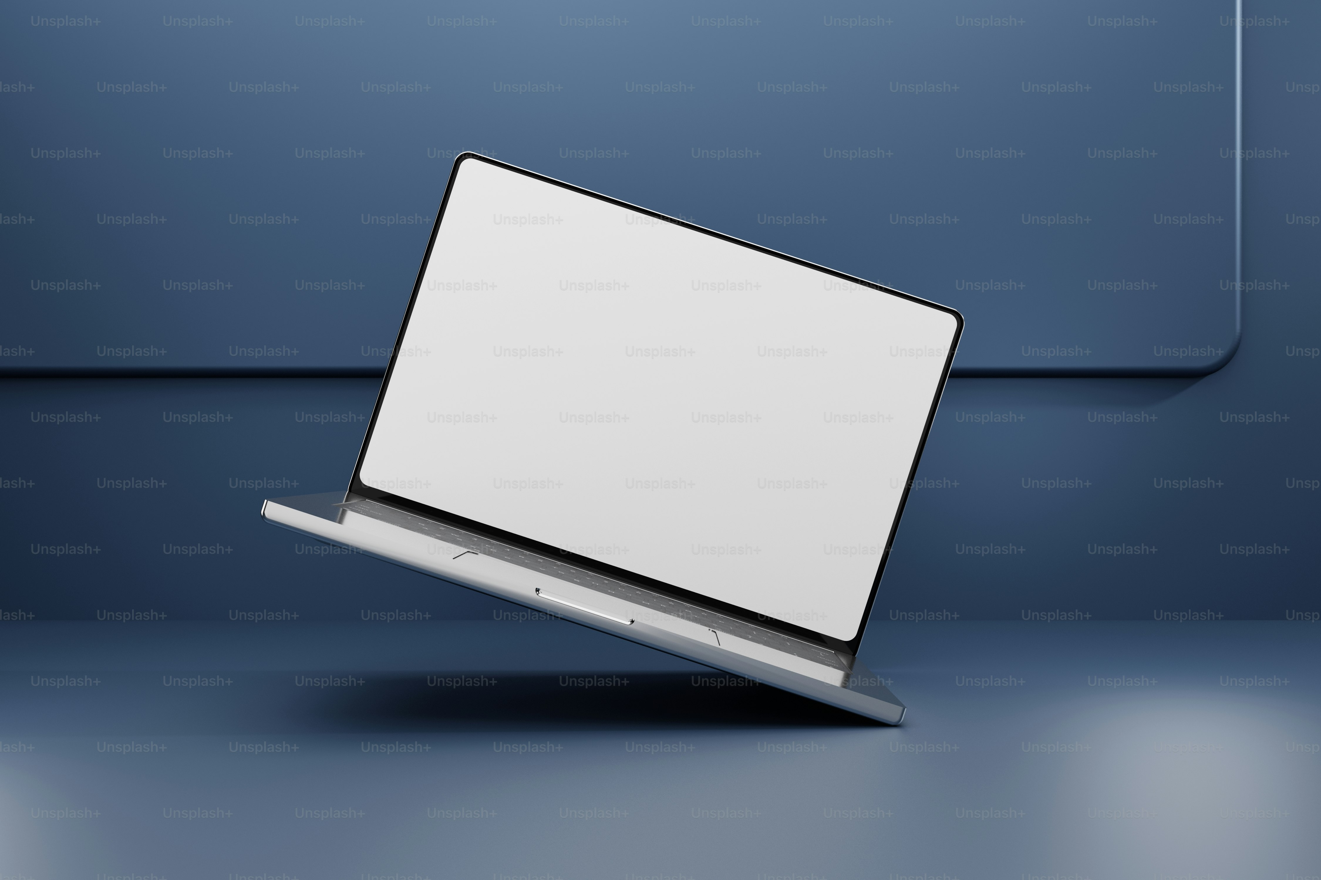 A computer monitor sitting on top of a table photo – Laptop Image on ...