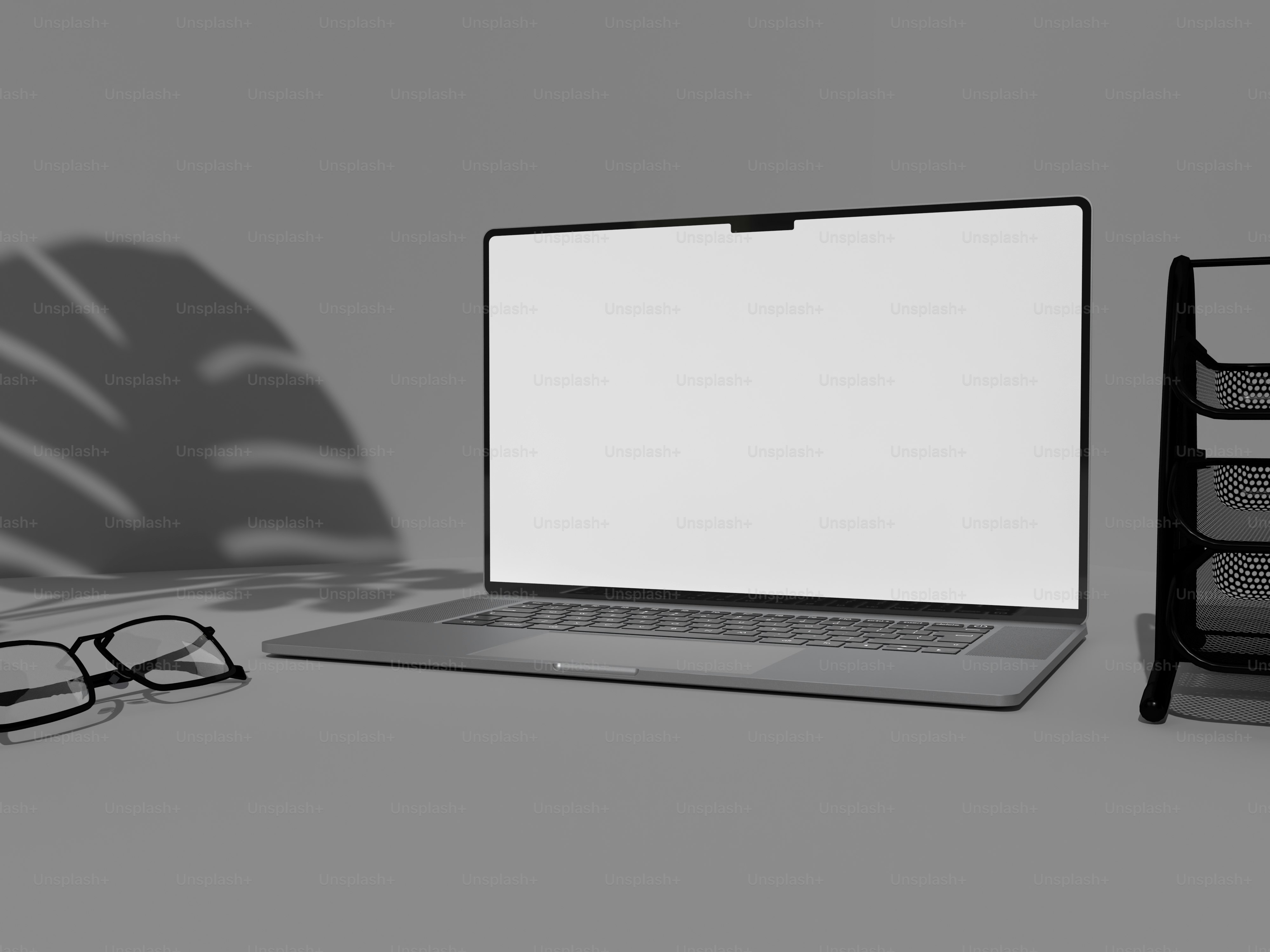 A laptop computer sitting on top of a desk photo – Laptop Image on Unsplash