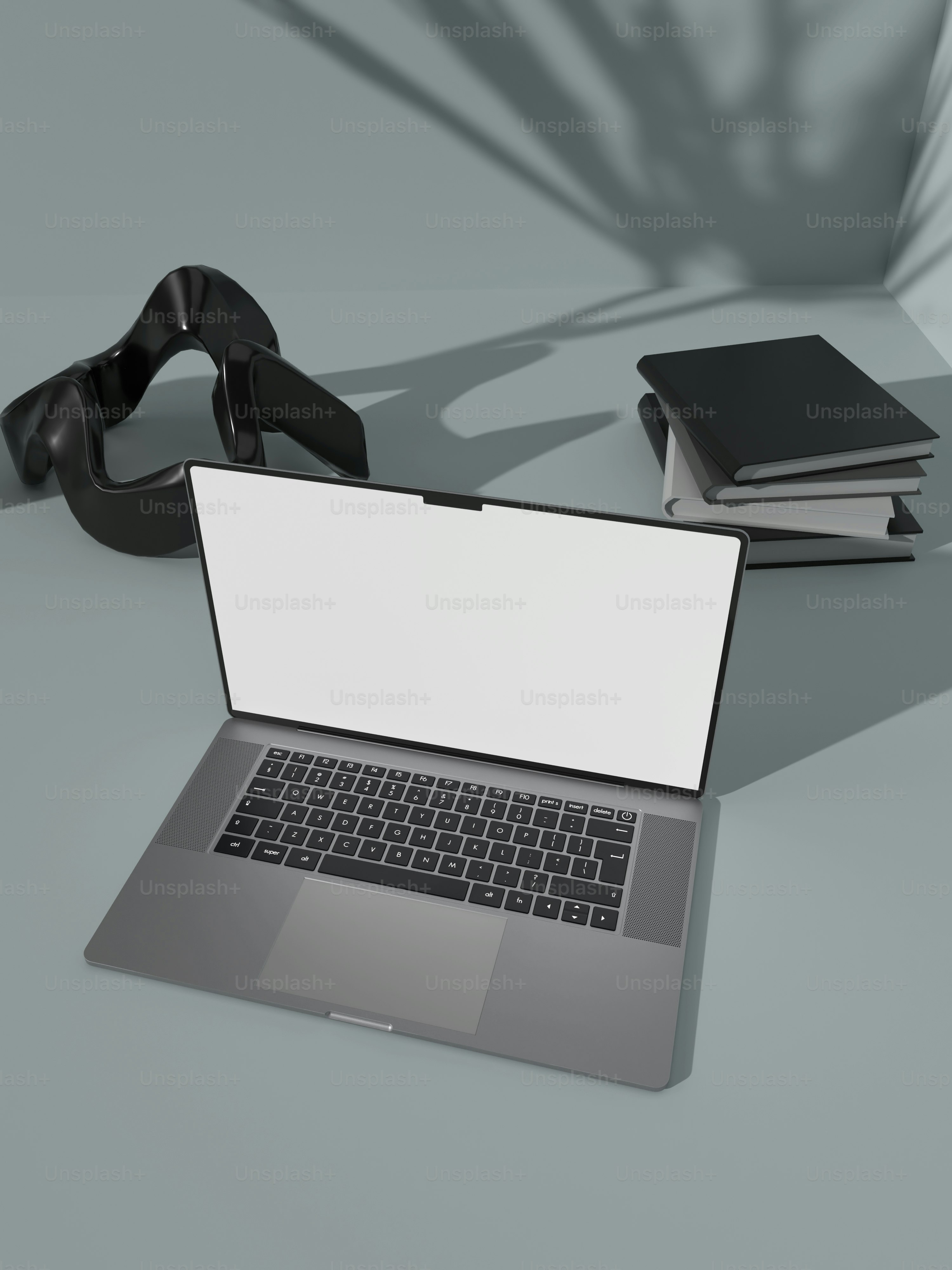 A laptop computer sitting on top of a desk photo – Laptop Image on Unsplash