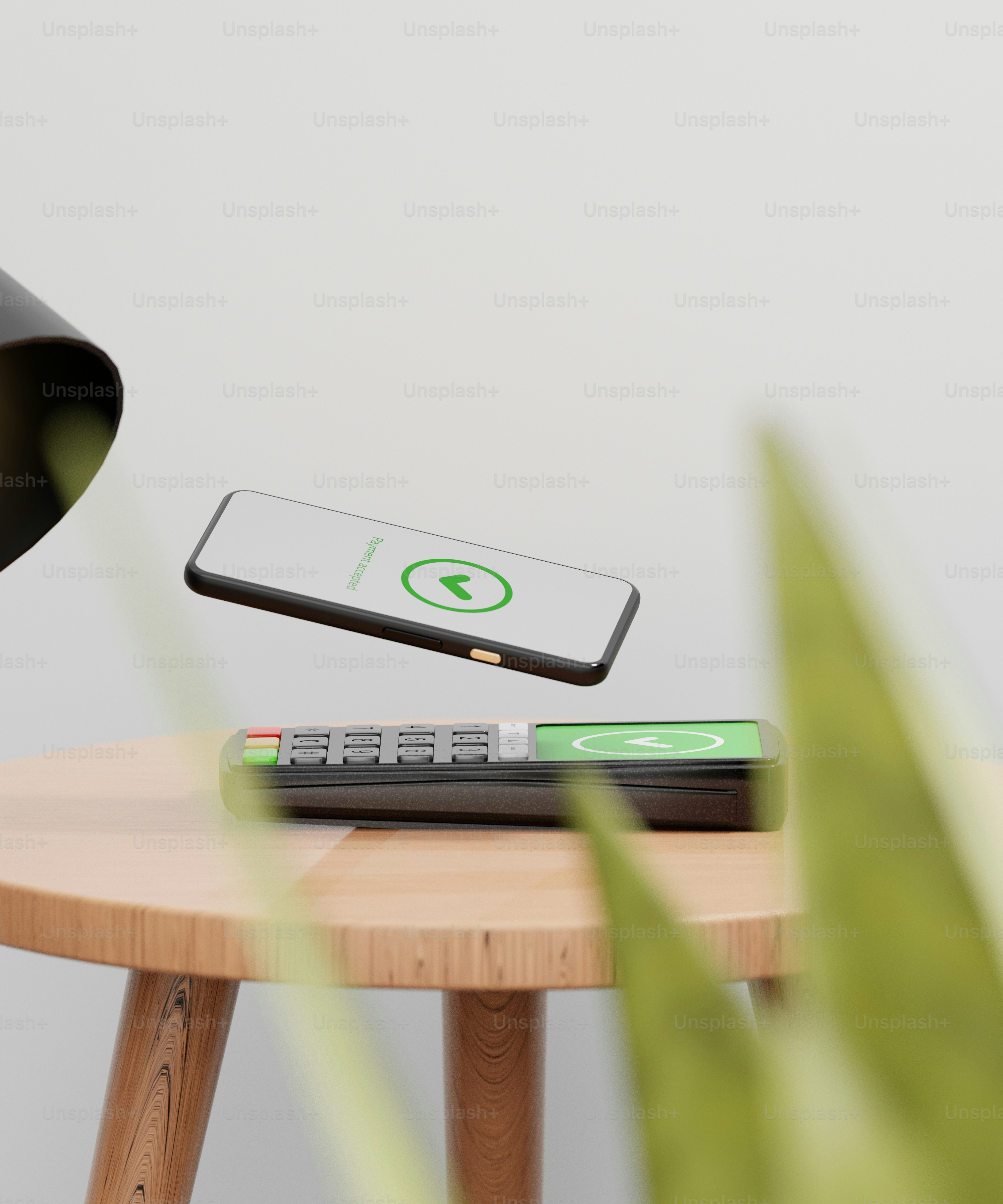 A remote control sitting on top of a wooden table photo – Contactless ...