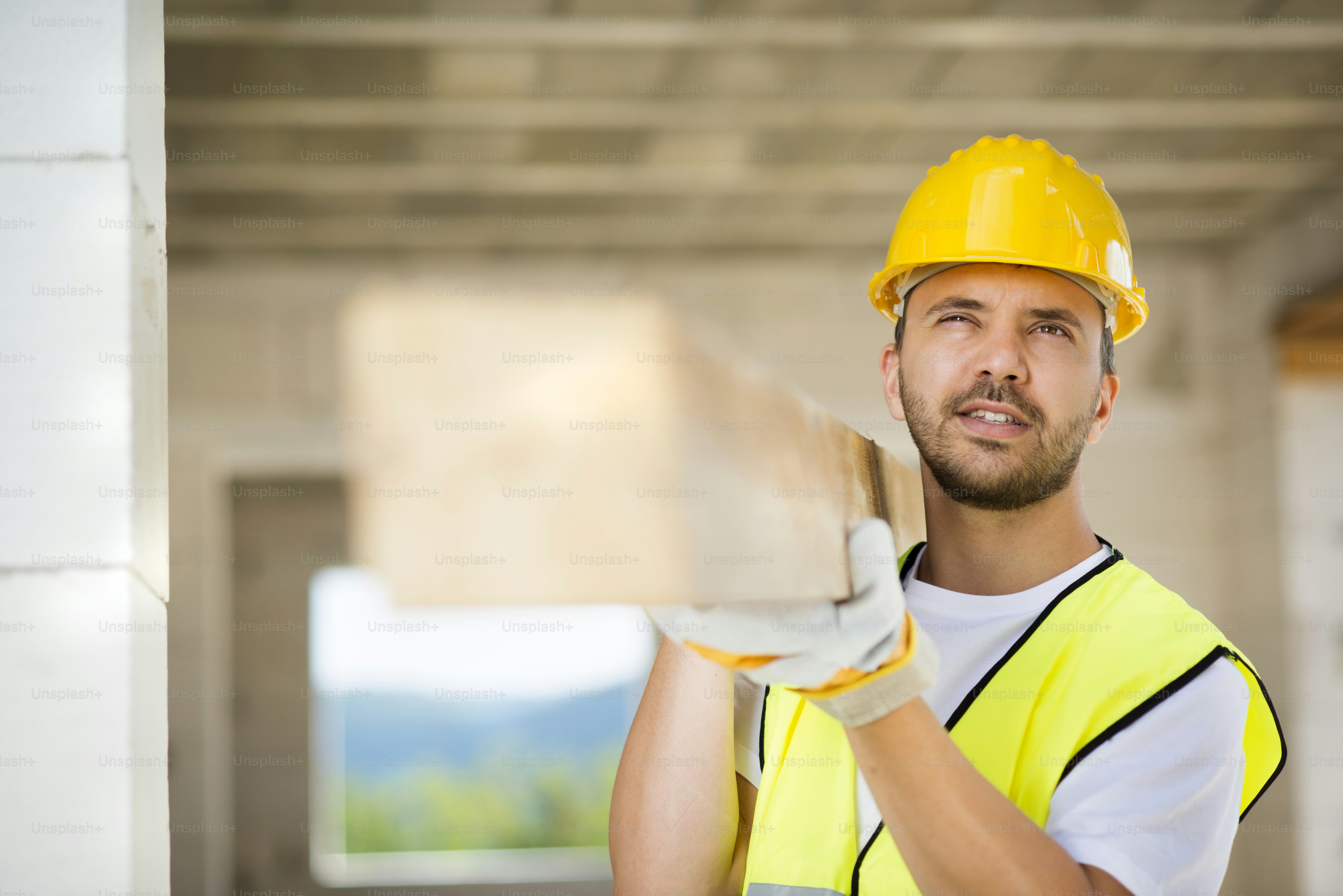 Construction worker is working on new house photo – Heavy Image on Unsplash