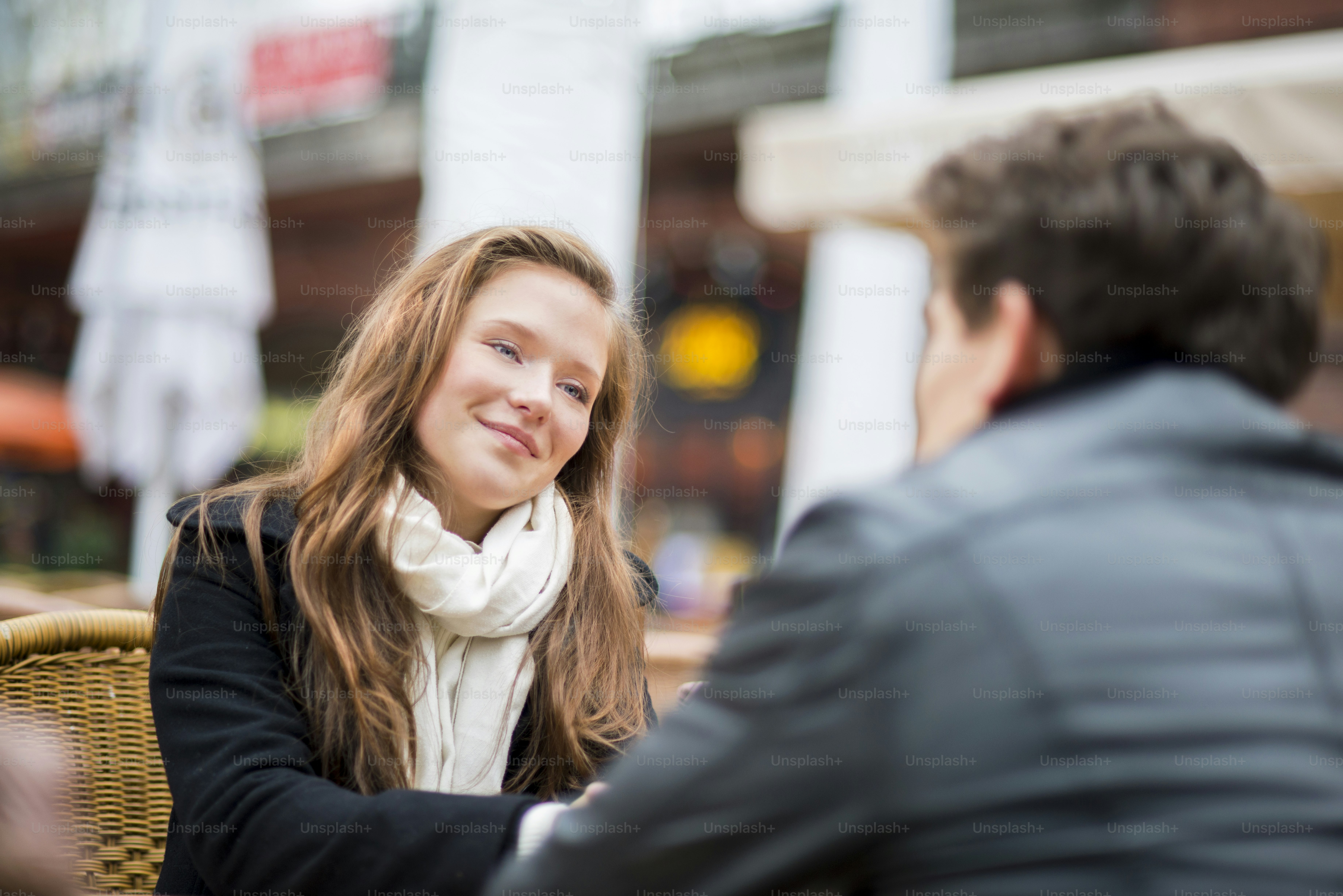 Hapy couple is having date in the street of city photo – Two people ...