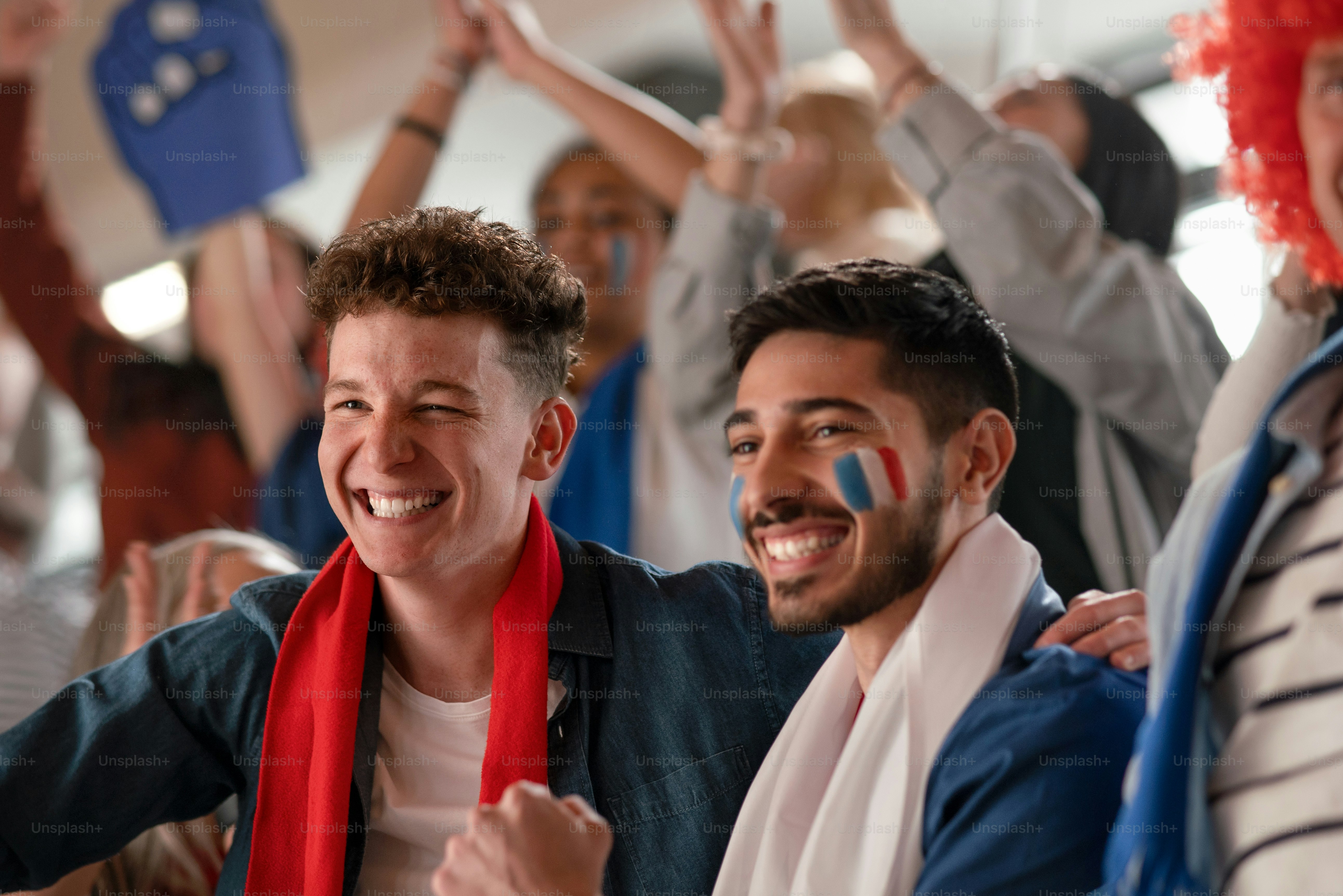 German football fans celebrating their team's victory at a stadium ...