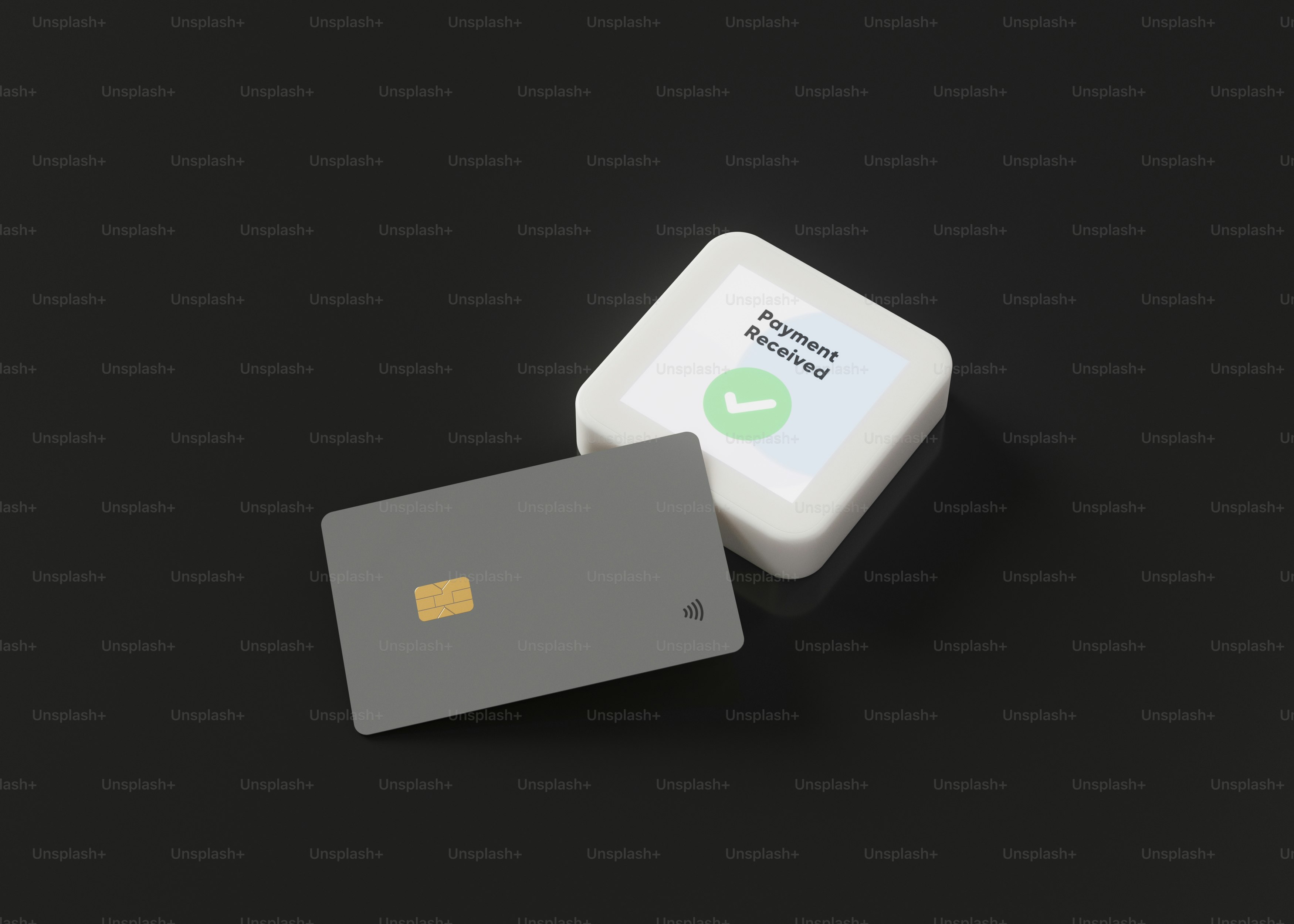 A sim card sitting on top of a black surface photo – Credit card Image ...