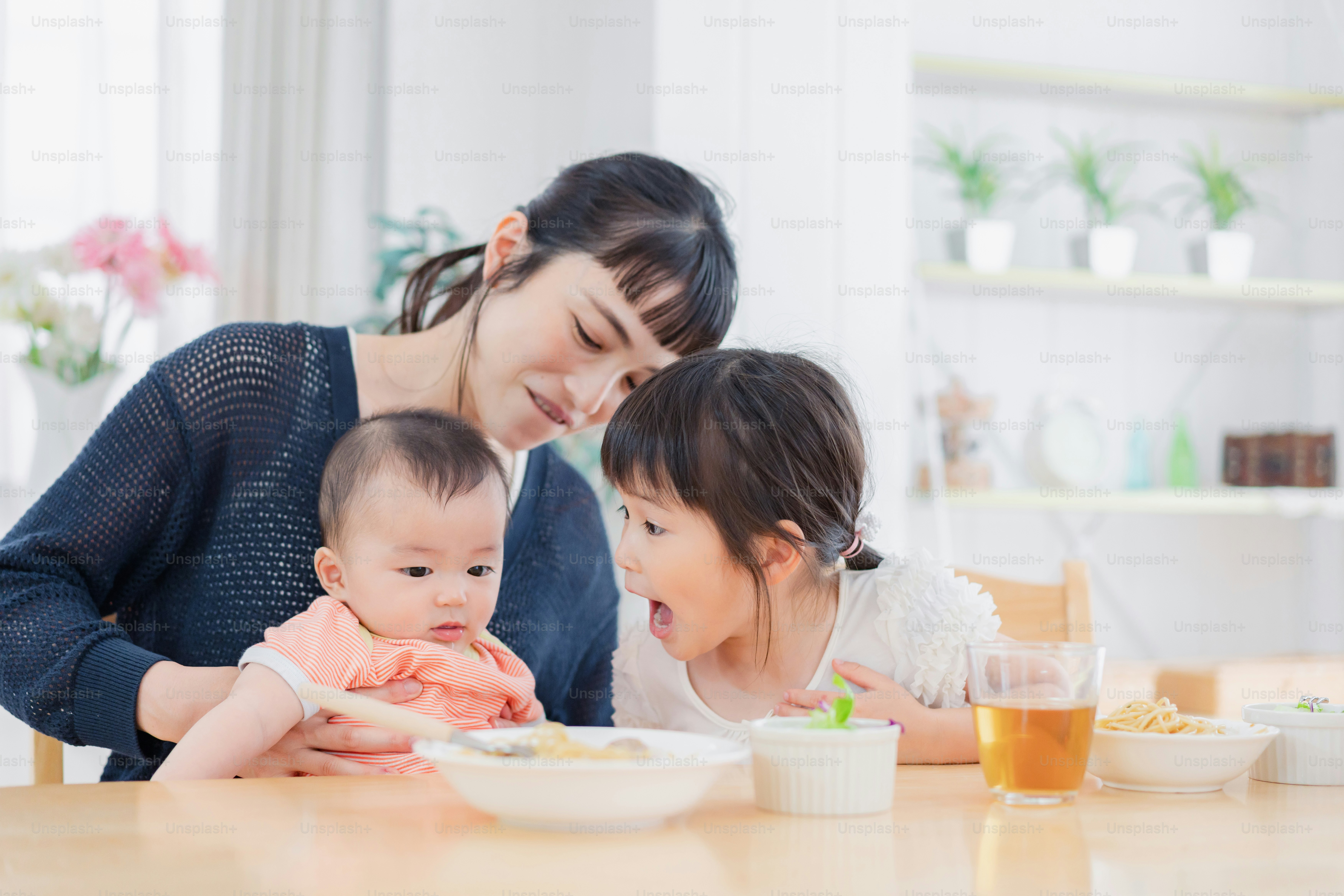 A child taking care of baby photo – Happiness Image on Unsplash