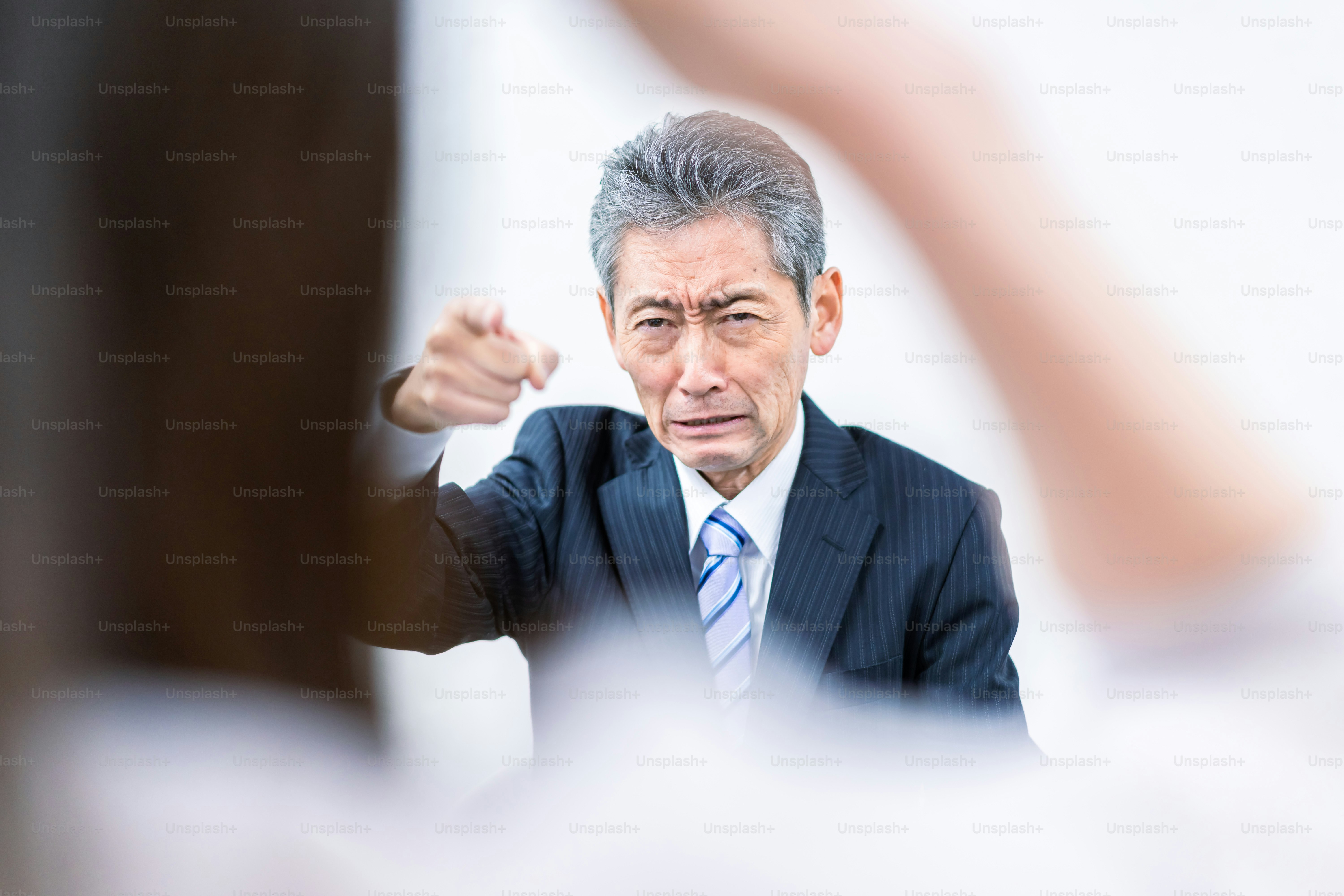 A boss harassing a female employee photo – Copy space Image on Unsplash