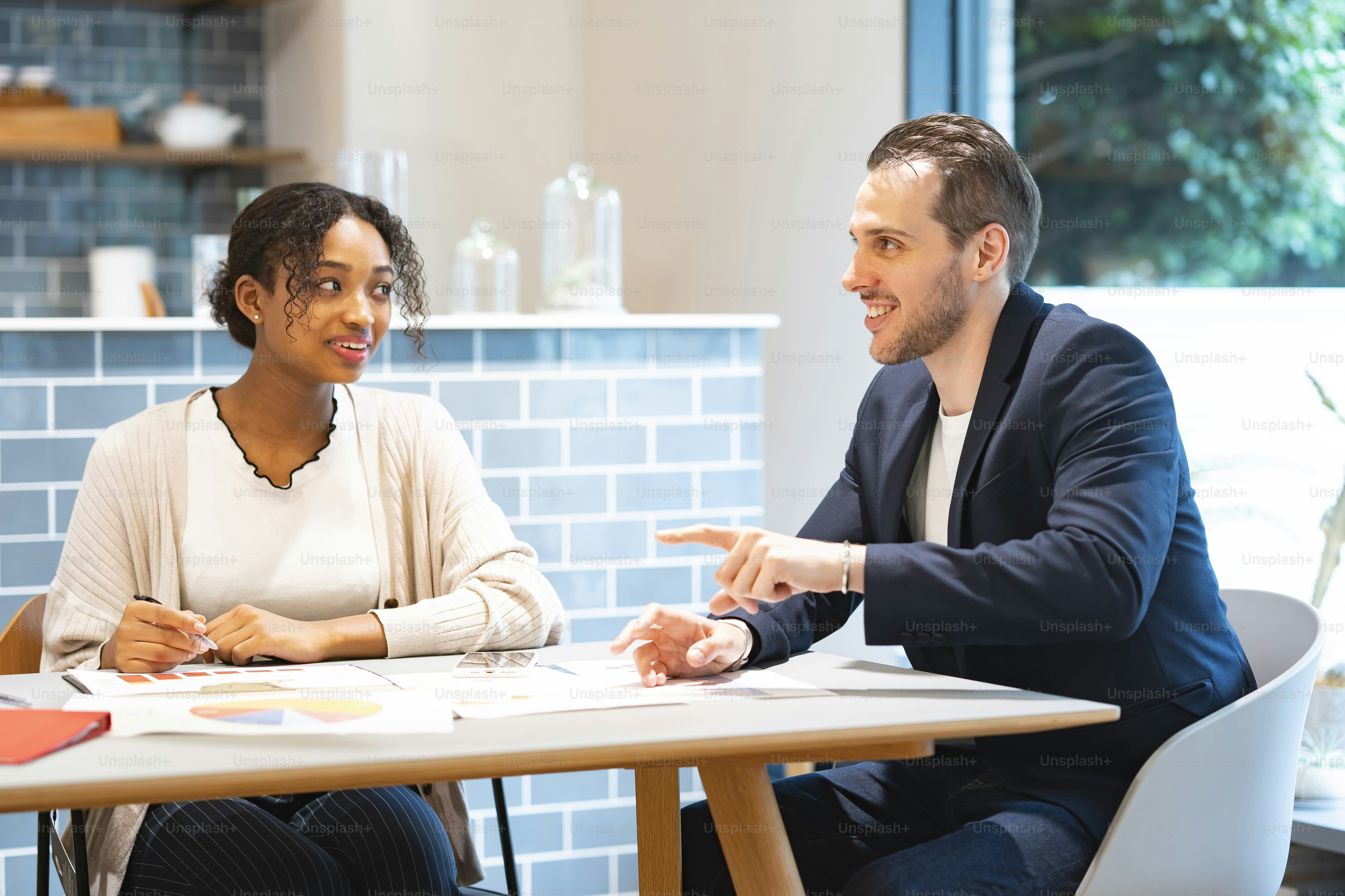 A snapshot of the business scene with young multinational members photo ...