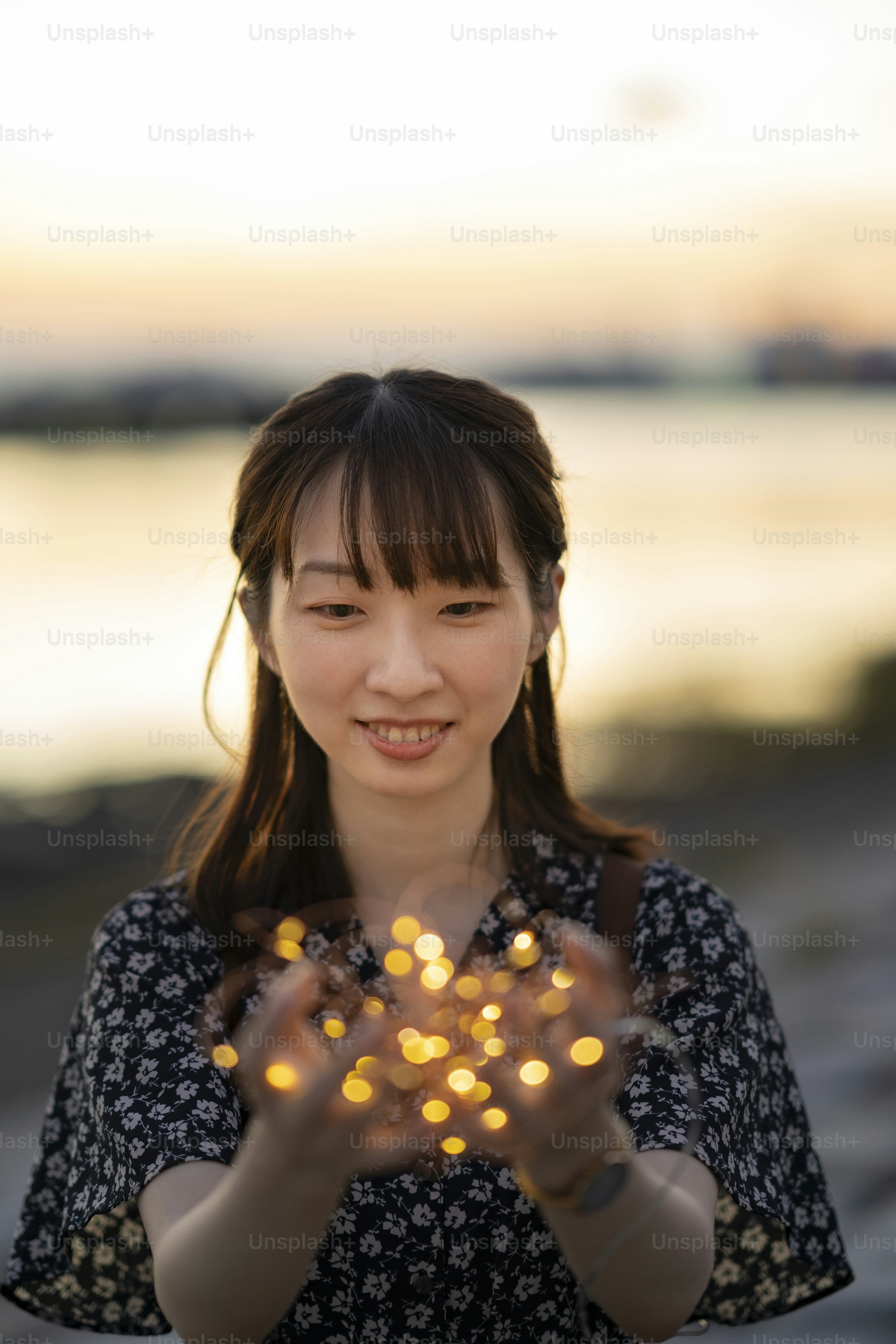 Asian young woman wrapping an illumination light with both hands photo – Japan Image on Unsplash