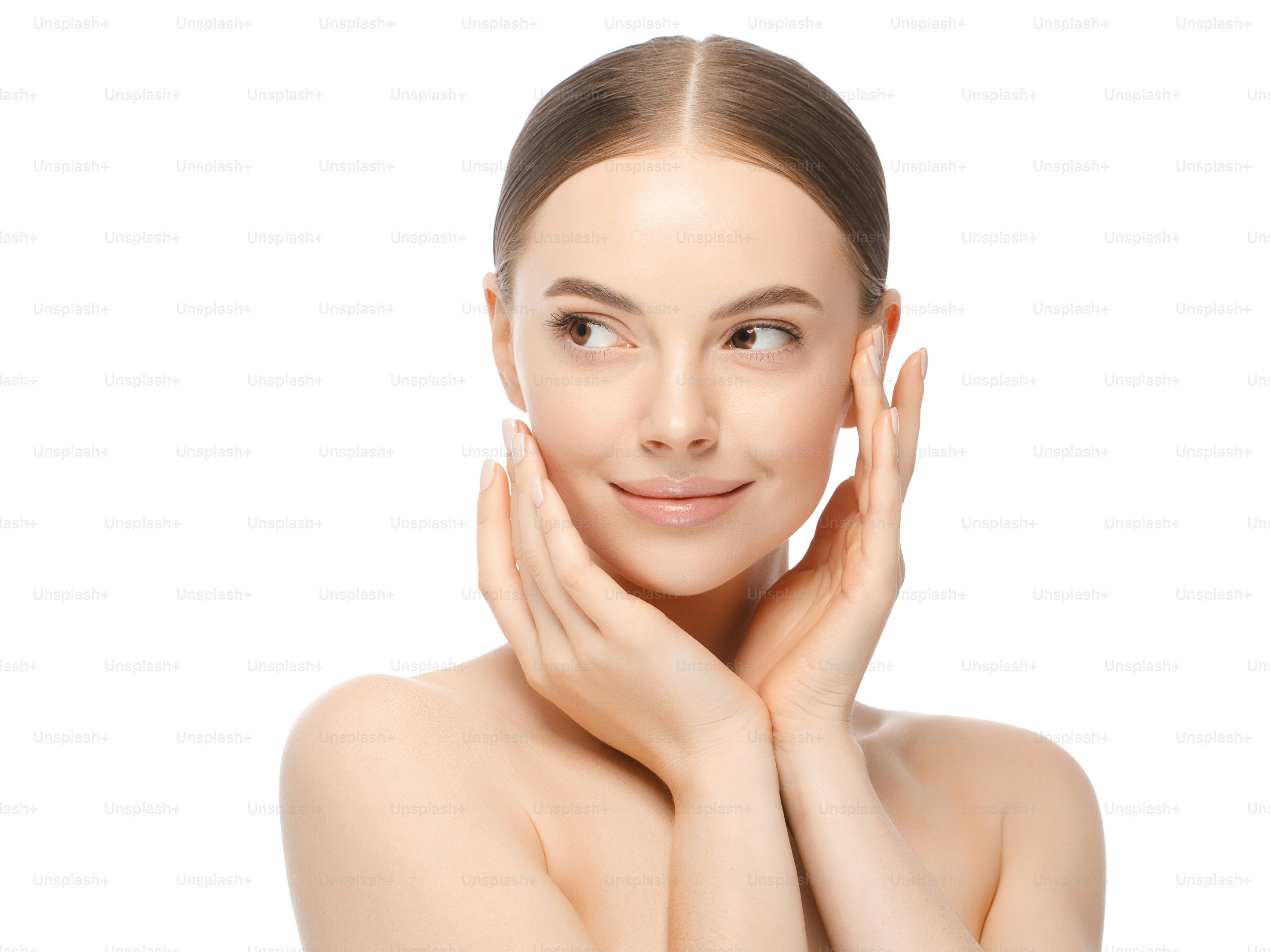 Beauty portrait of young woman looking away, holding hands near face ...