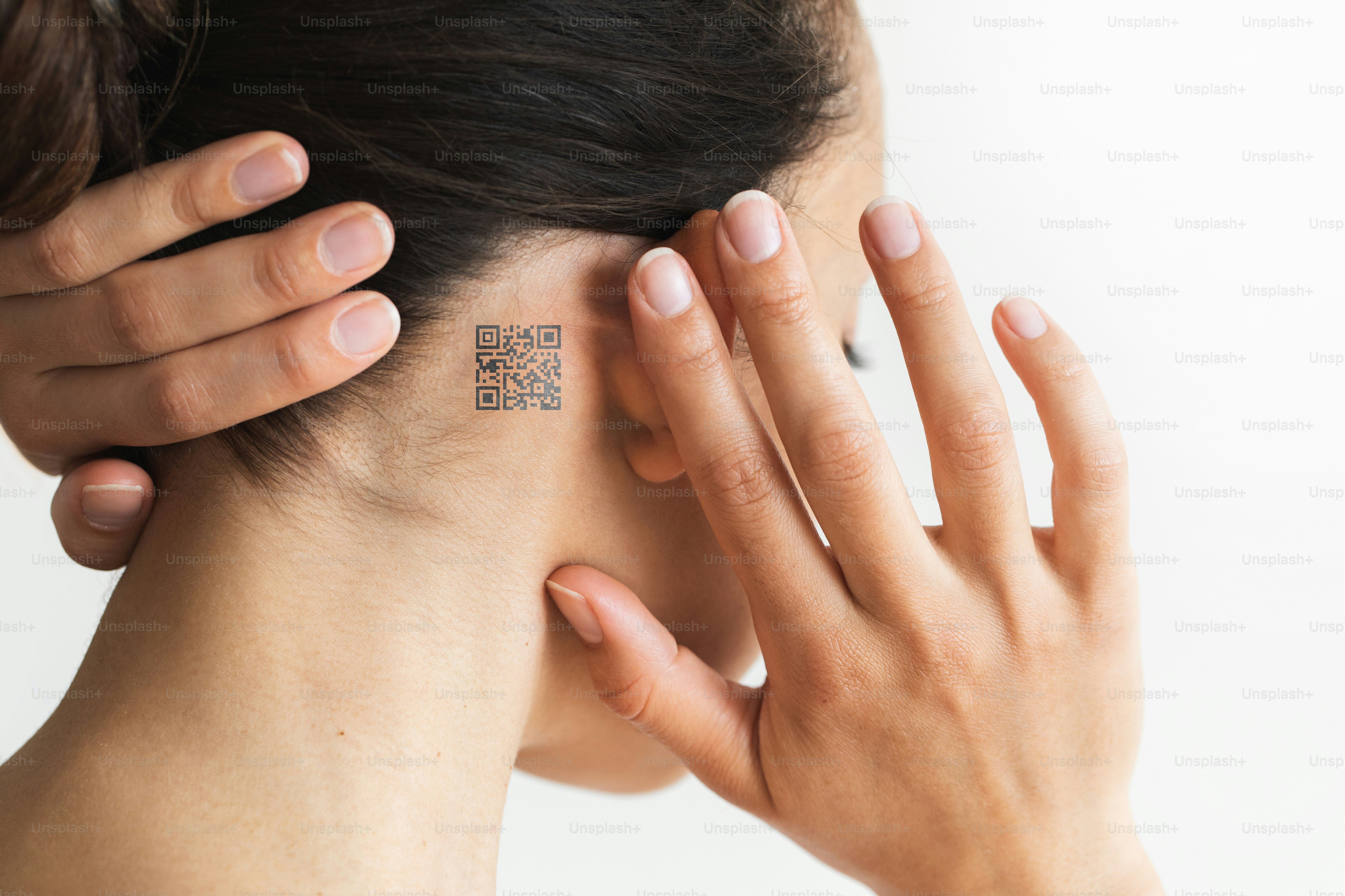 Woman with QR code behind ear. Future technology of chipization people ...