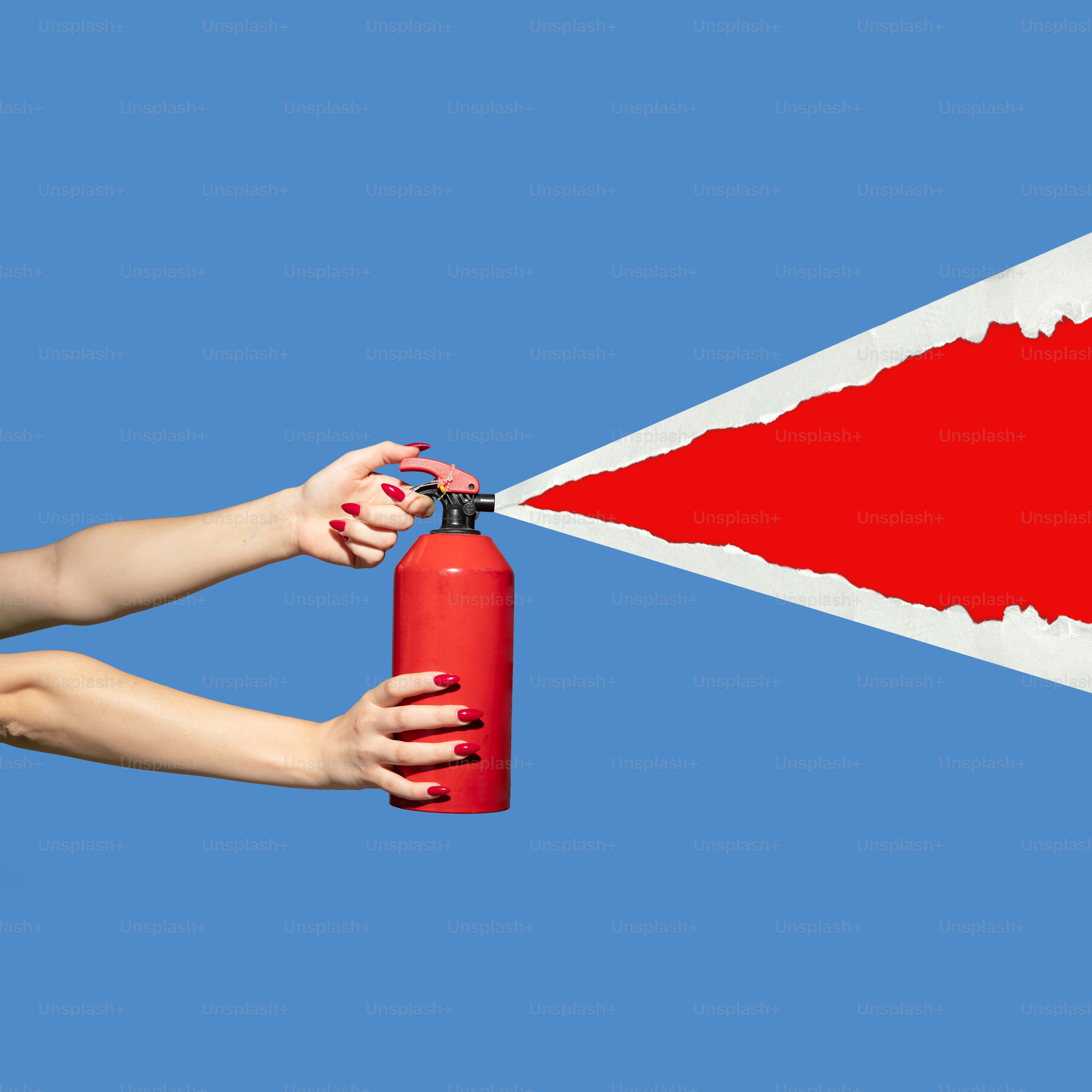 Fire extinguisher in female hands. Hands aesthetic on bright background ...