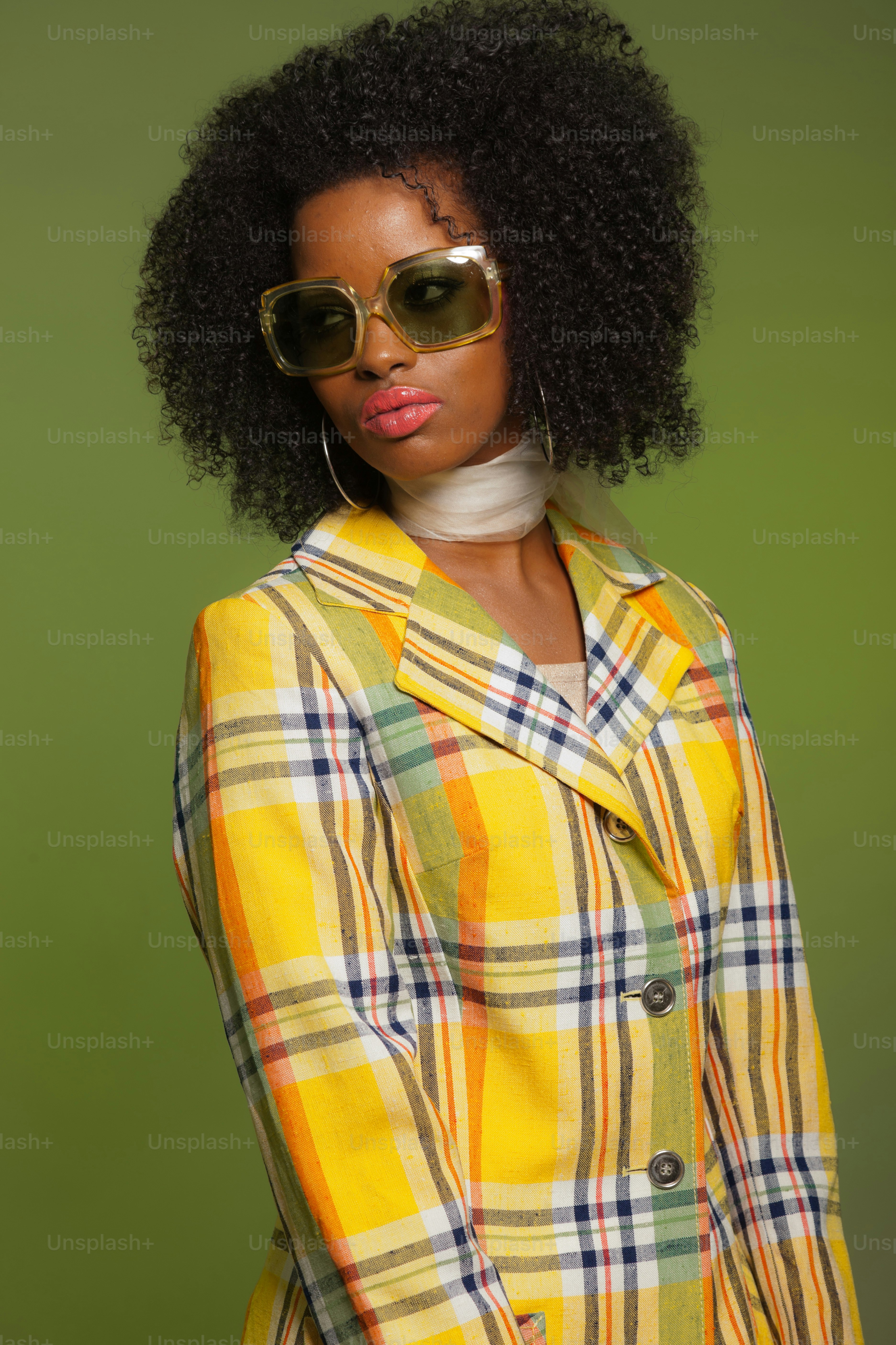 Dancing retro 70s fashion african woman with sunglasses. Yellow jacket ...