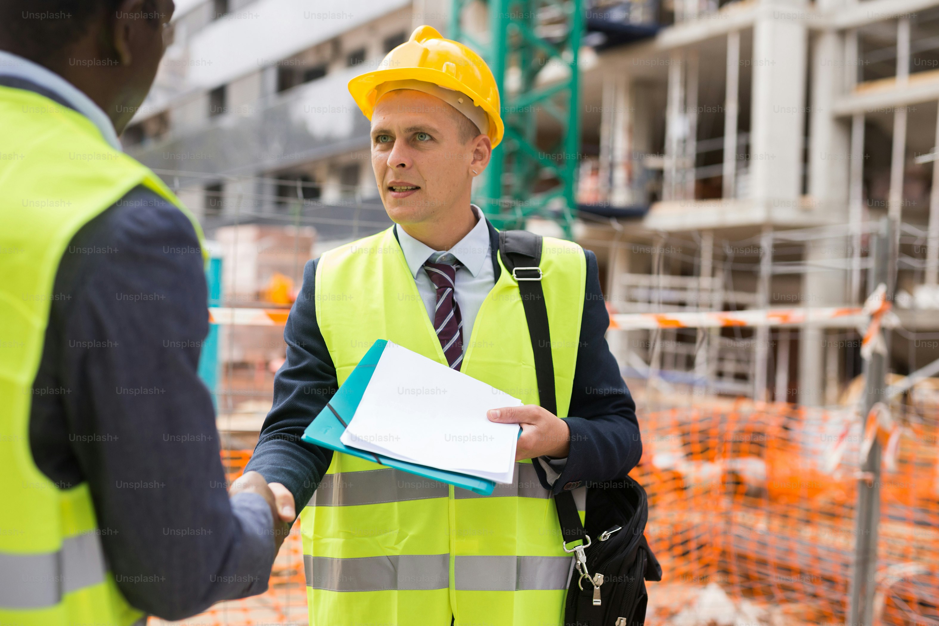 African-american foreman and Caucasian builder have signed agreement ...