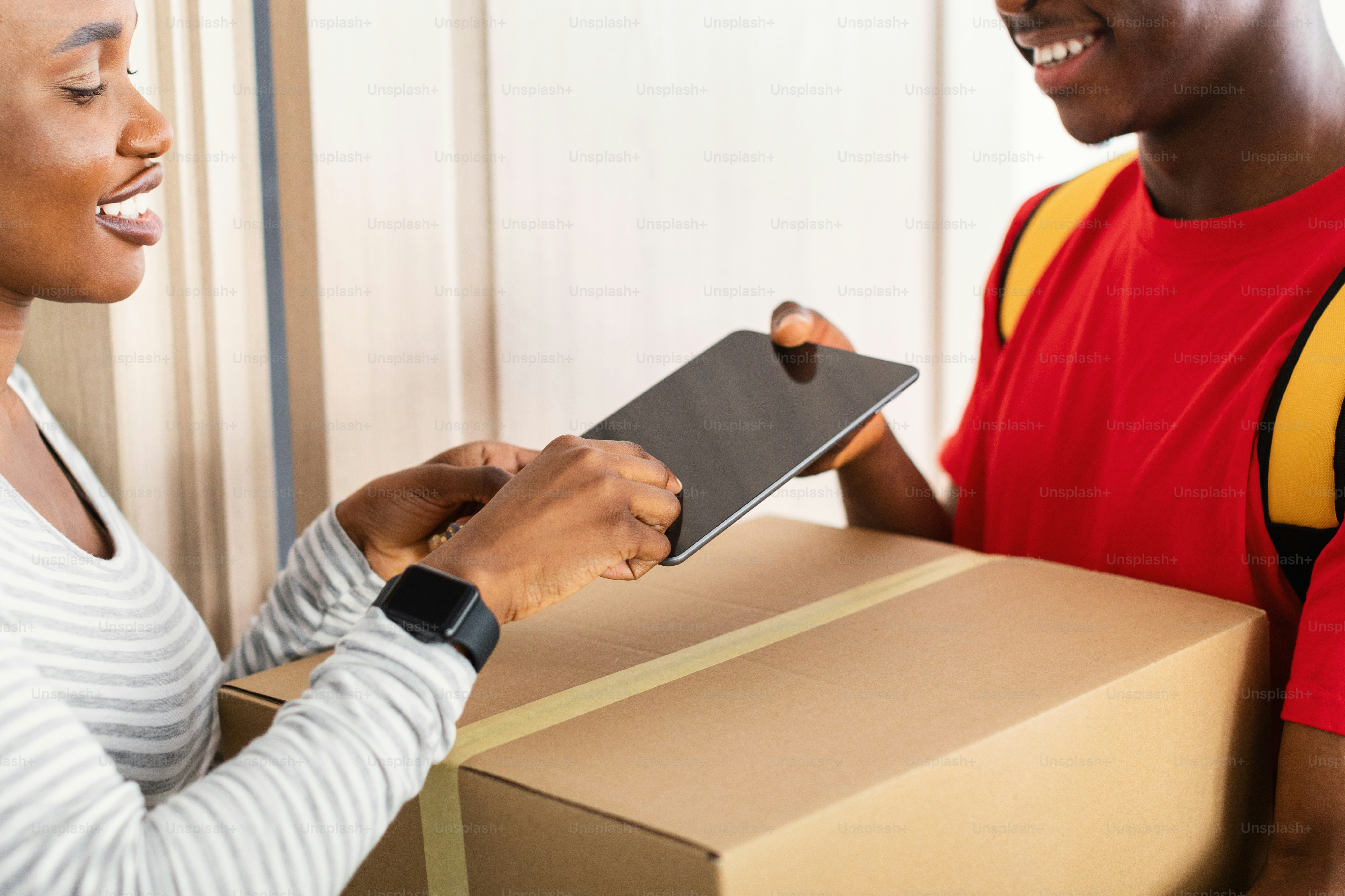 Parcel Delivery. Black Lady Receiving Delivered Parcel From Male ...