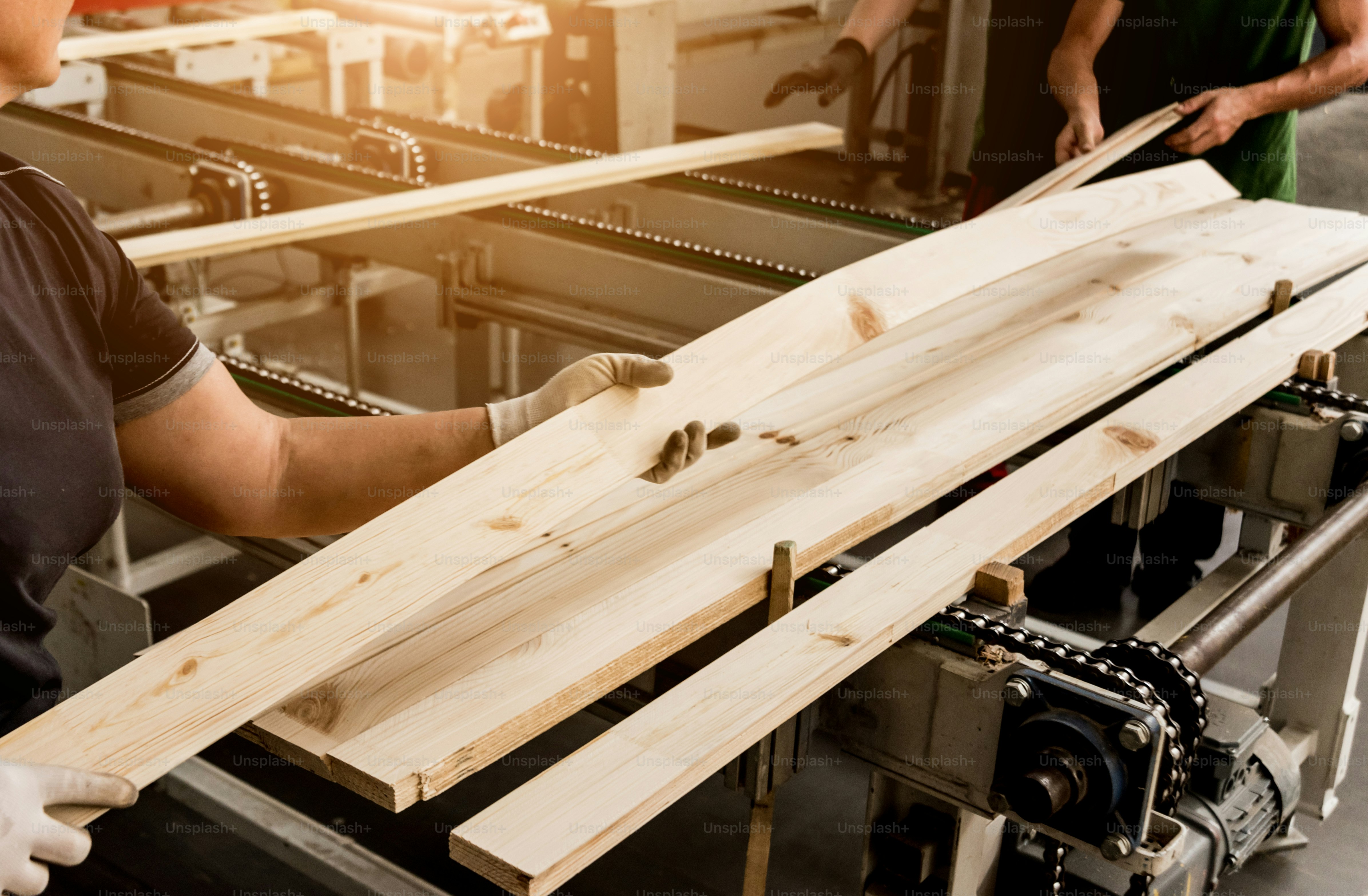 Production line of the wooden floor factory. CNC automatic woodworking ...