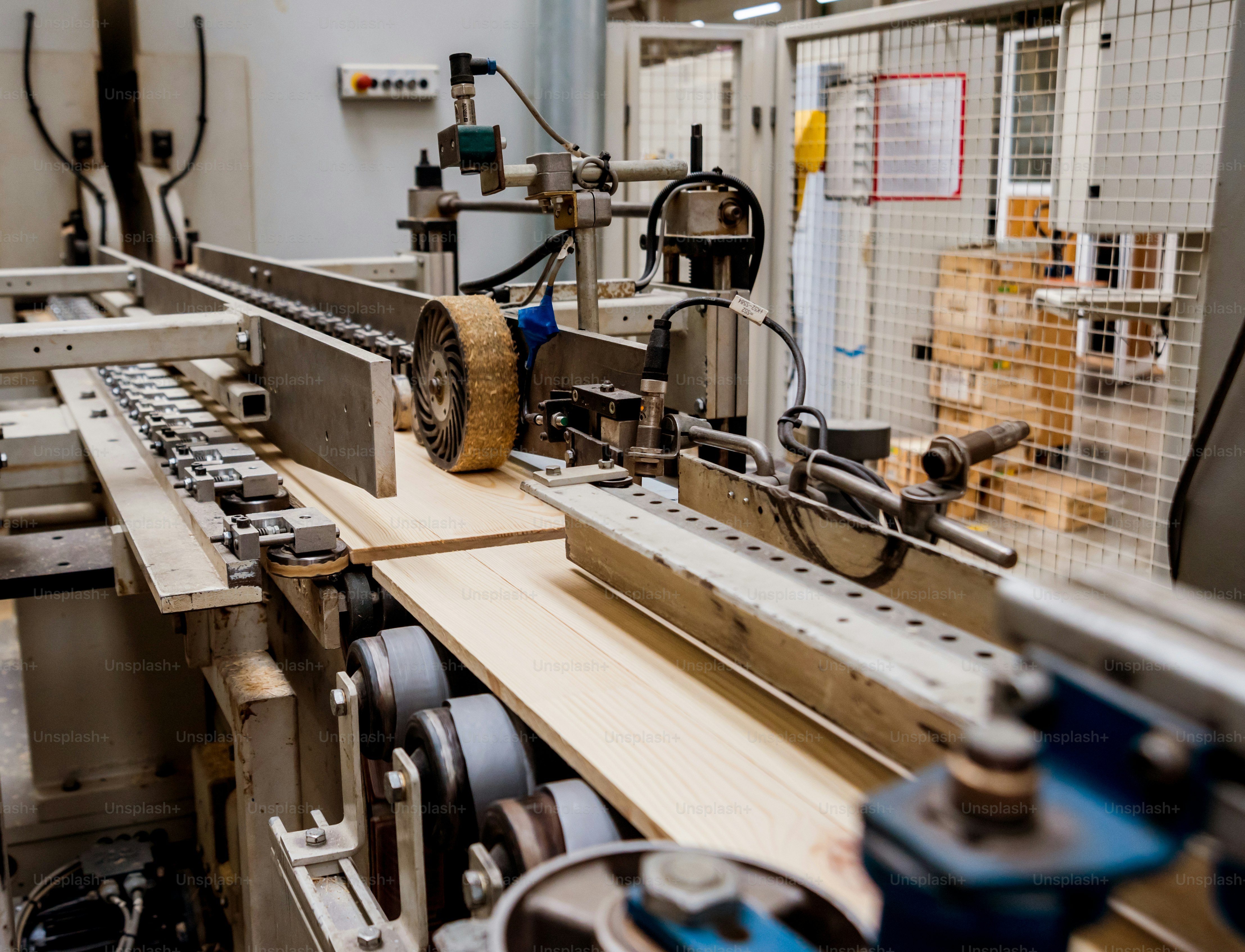 Production line of the wooden floor factory. CNC automatic woodworking ...