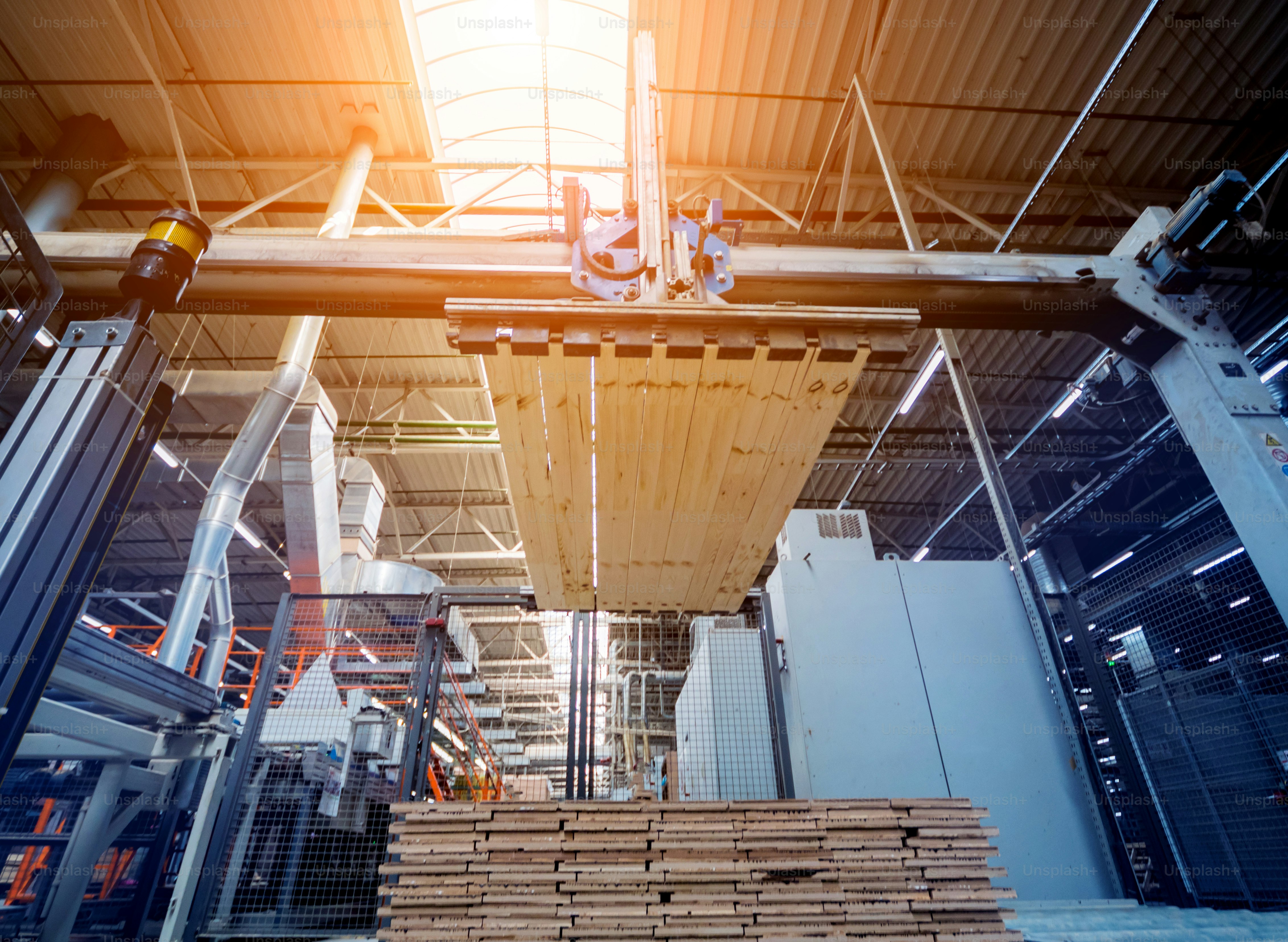 Production line of the wooden floor factory. CNC automatic woodworking ...