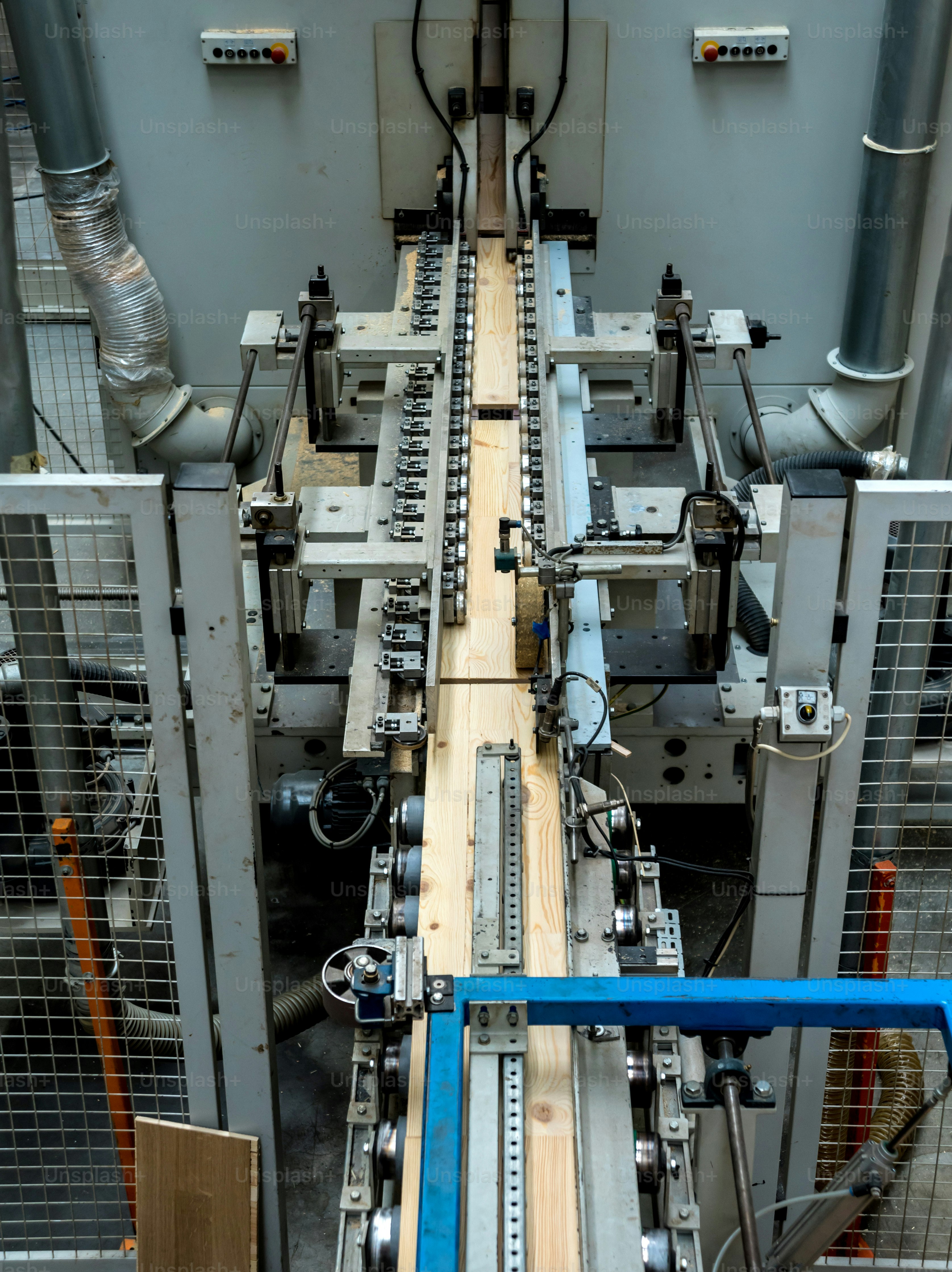 Production line of the wooden floor factory. CNC automatic woodworking ...