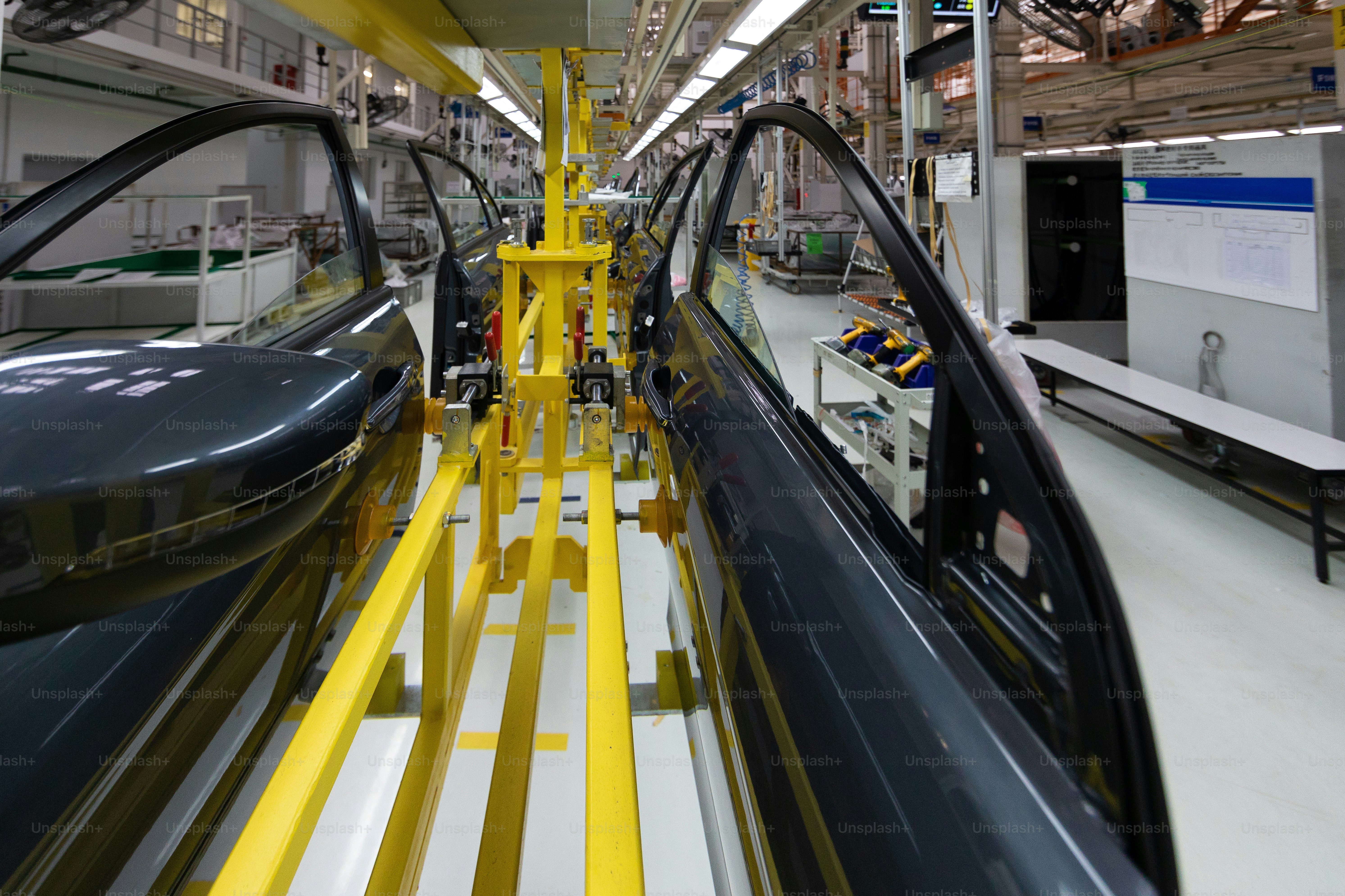 Automated car Assembly line. Assembly of car door. plant of automotive ...
