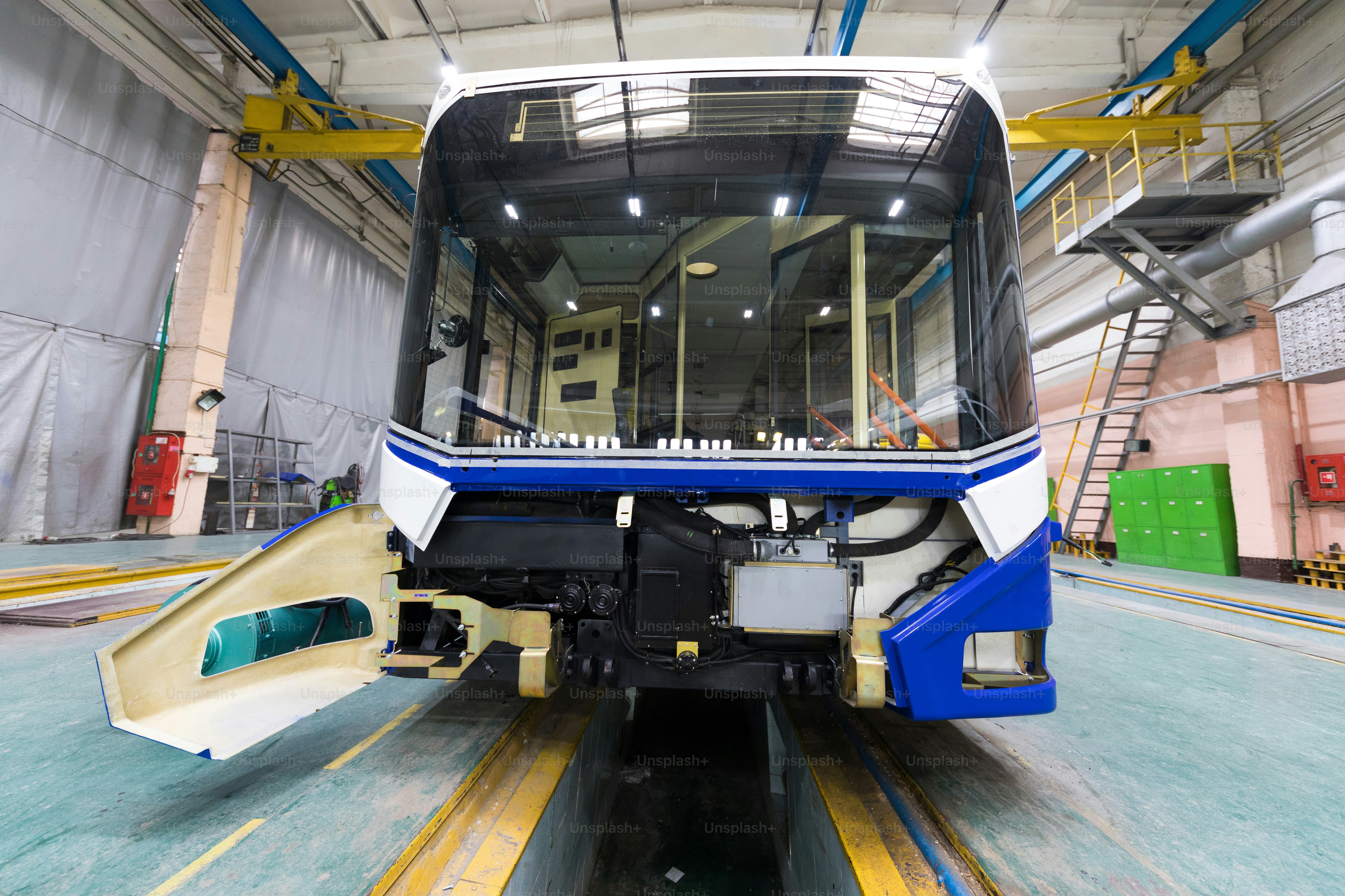 One working day of modern automatic bus manufacturing with unfinished ...