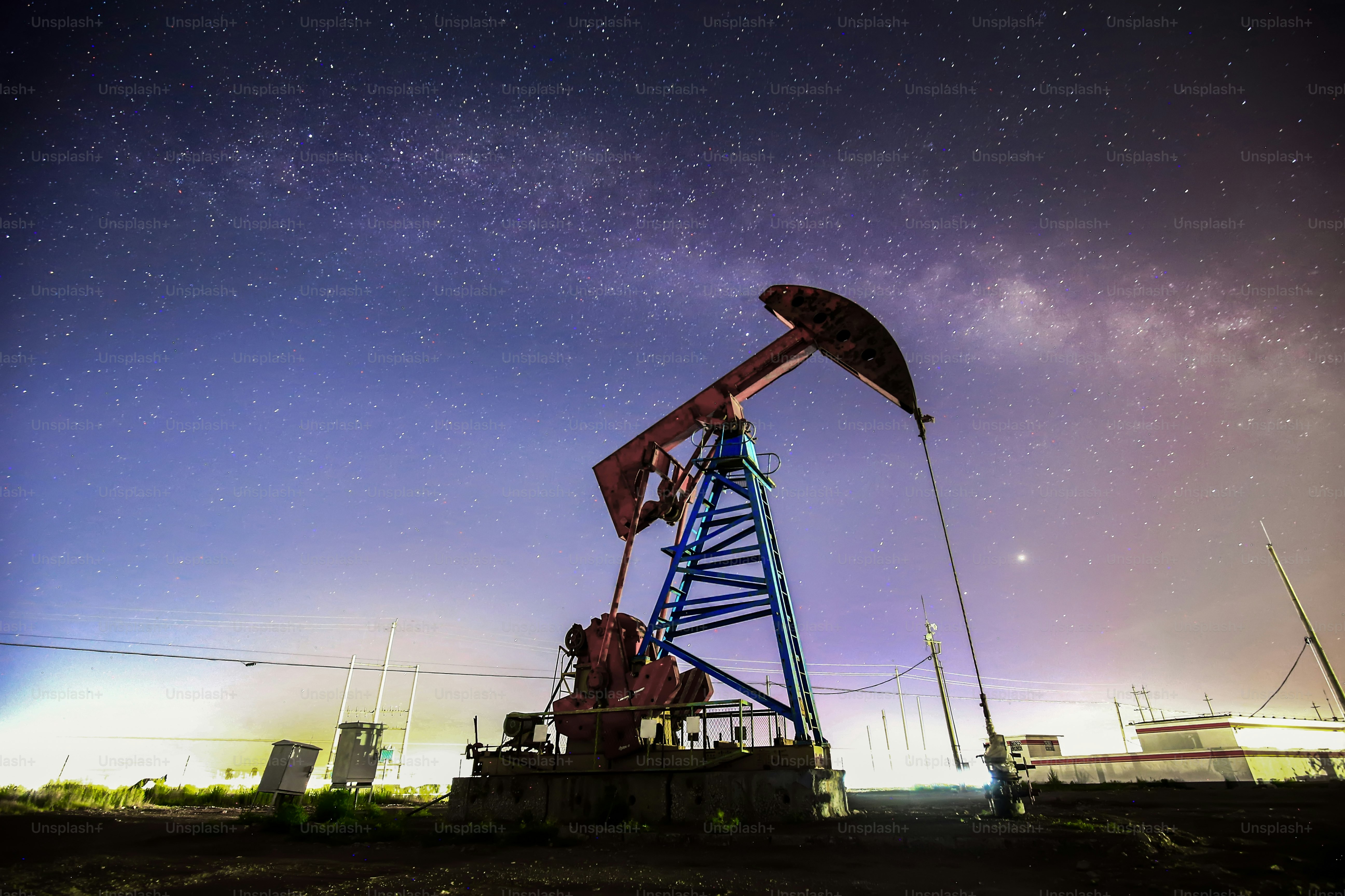 At night, oil pumps under the stars photo – Fuel and power generation ...