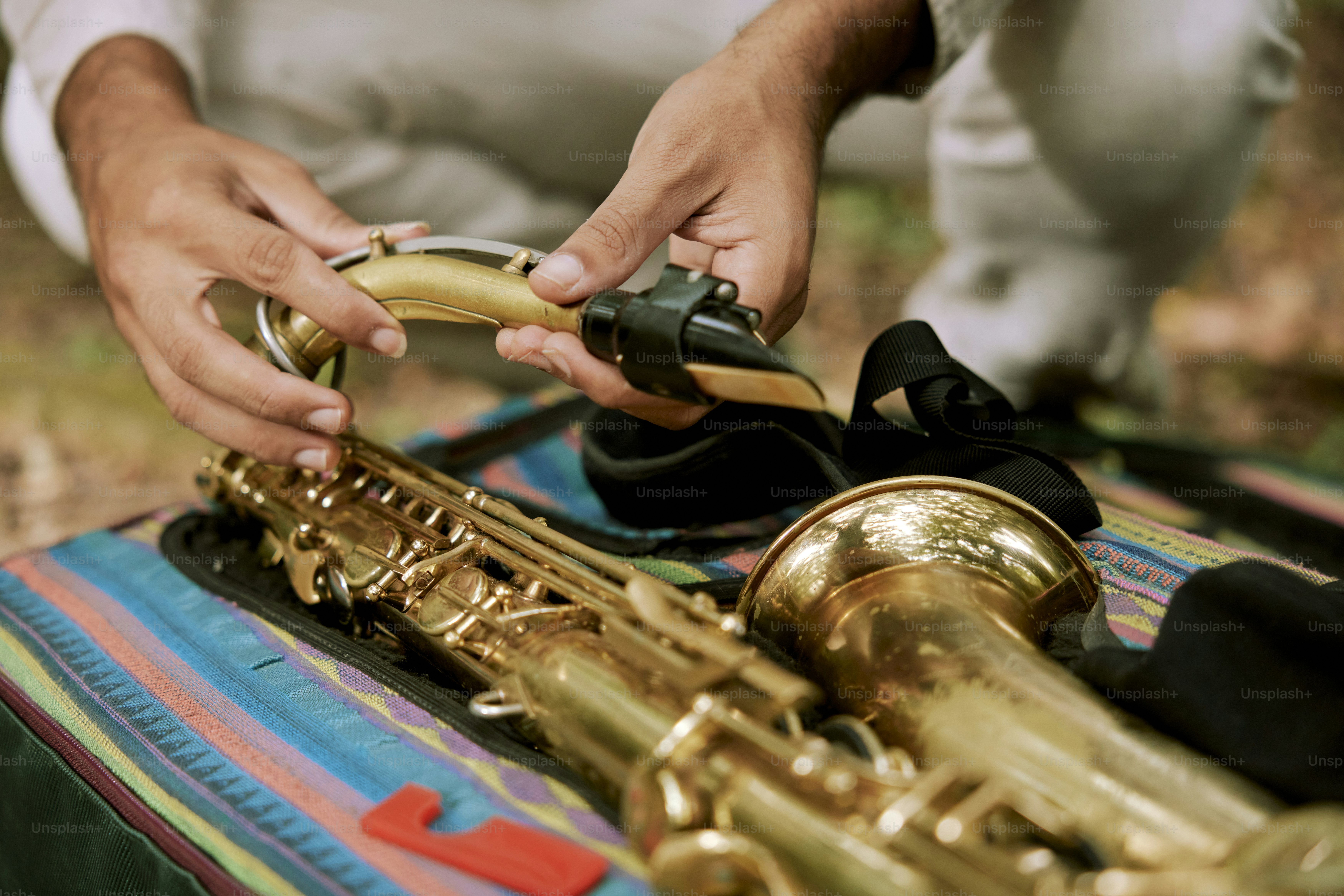 A close up of a person playing a saxophone photo – Musician Image on ...