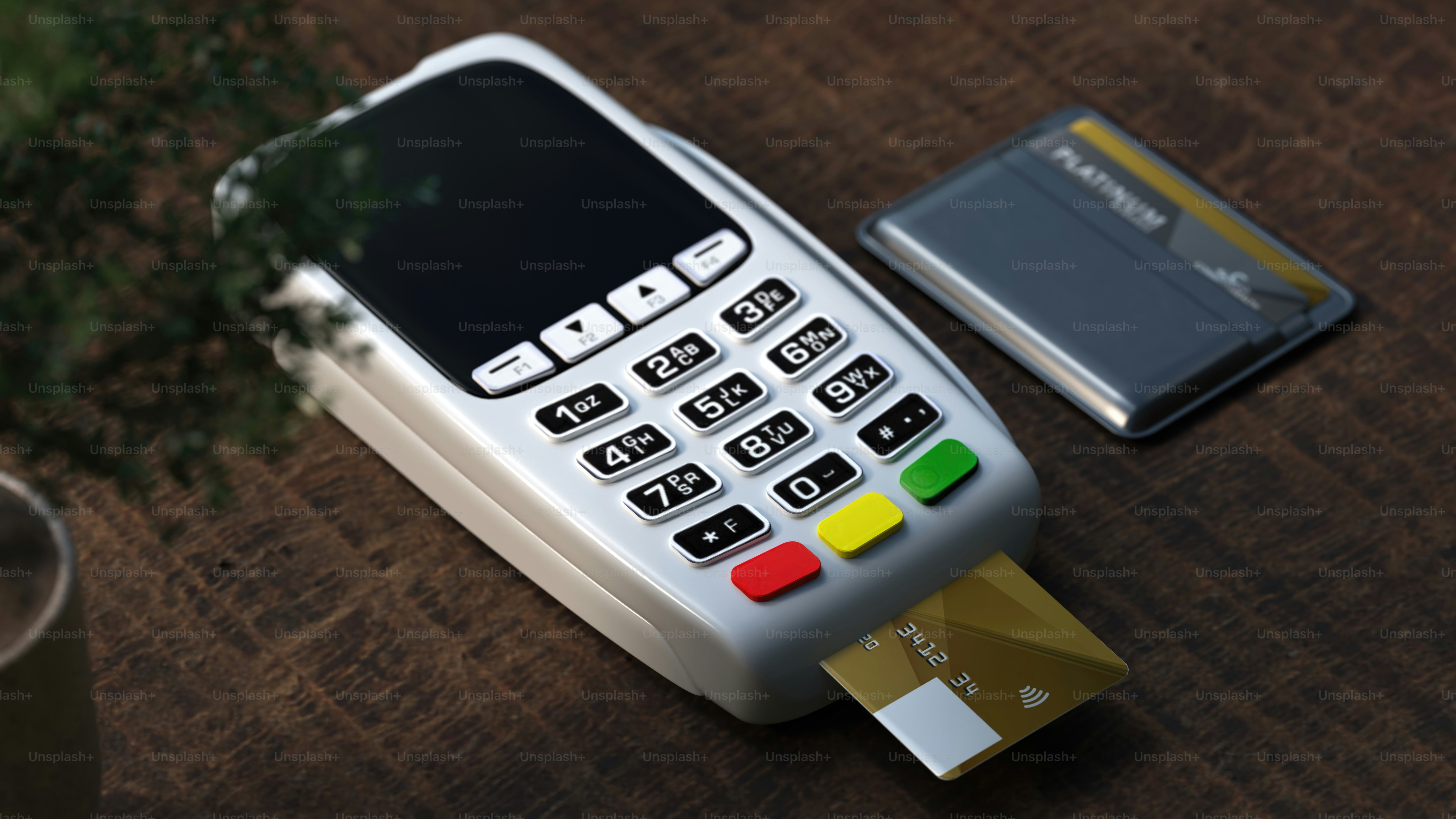 A cell phone and a credit card on a table photo – Card Image on Unsplash