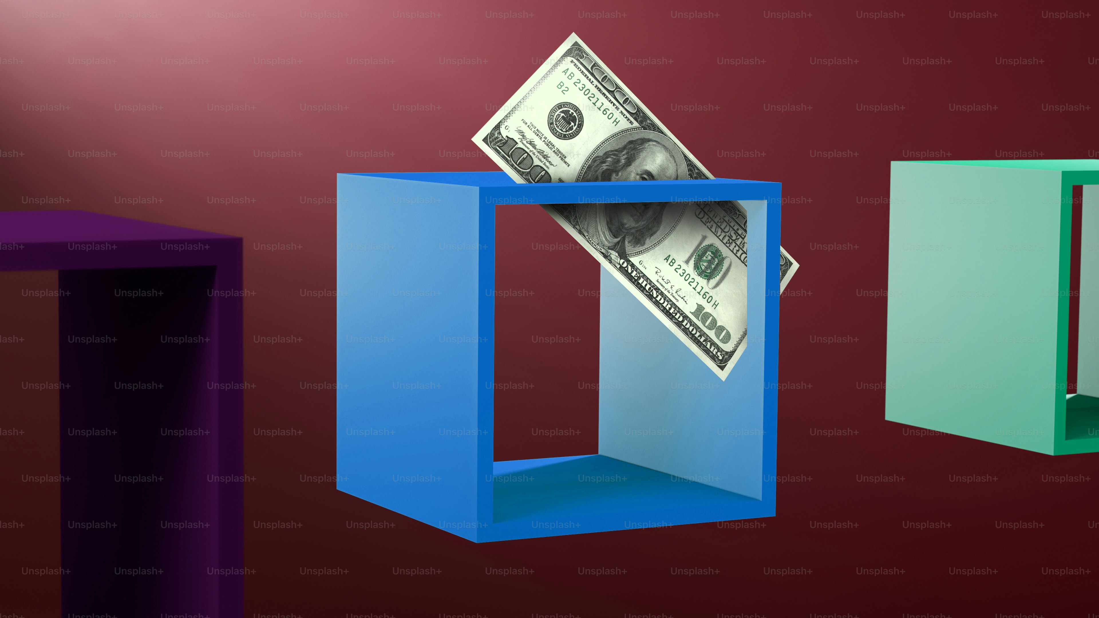 A dollar bill sticking out of a blue box photo – Cost of living Image ...