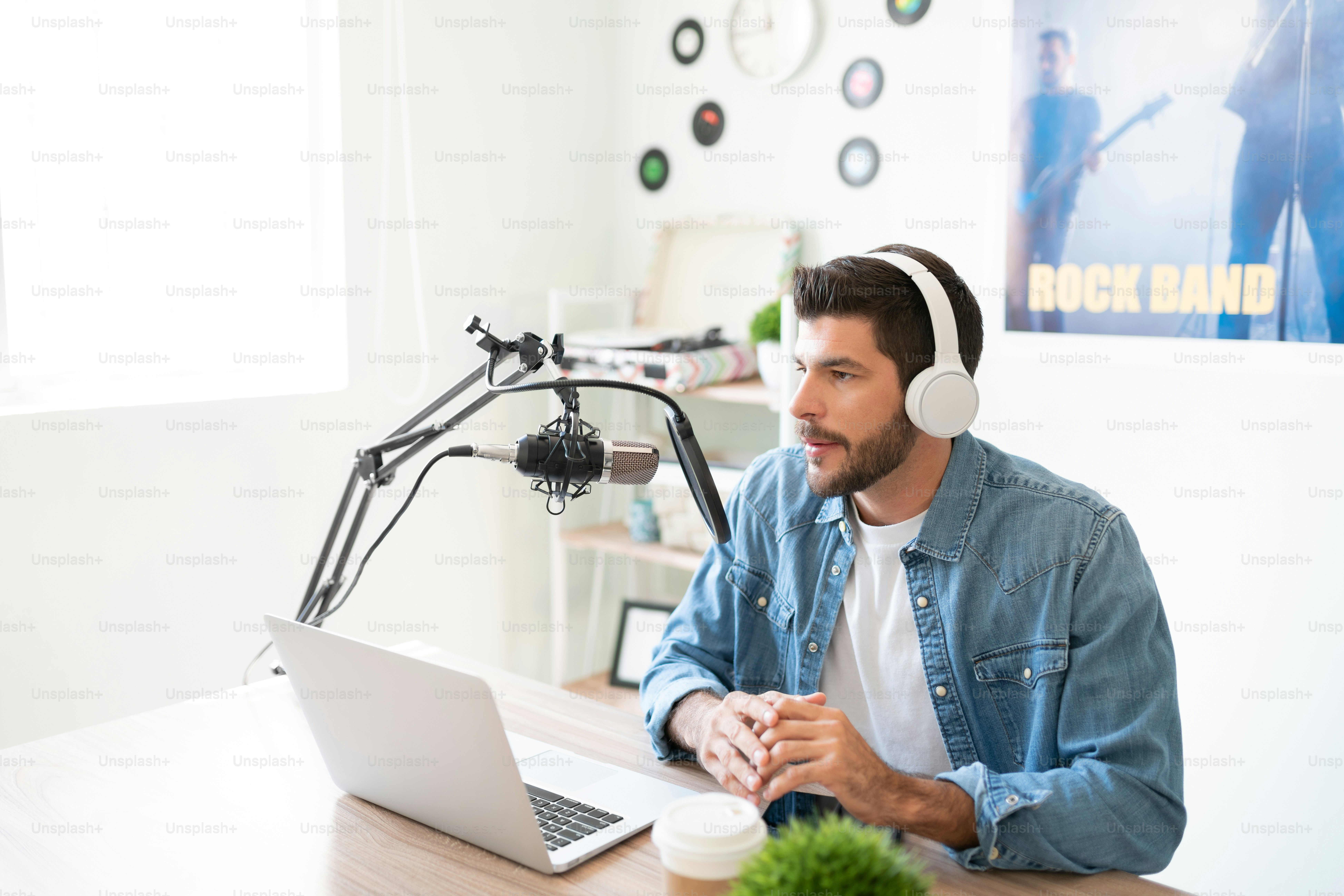 Hispanic radio host and broadcaster looking serious while talking about ...