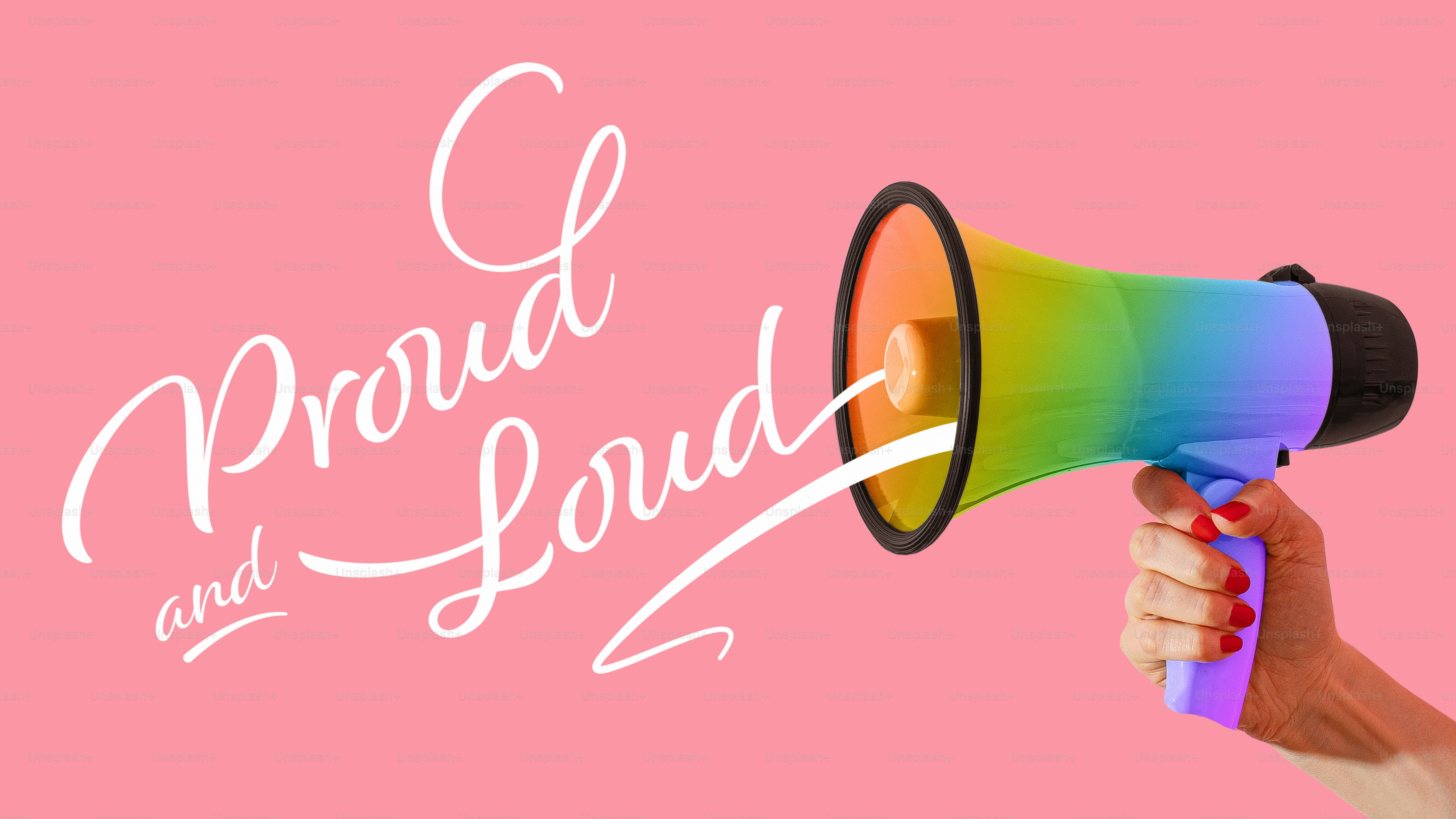 A hand holding a rainbow colored megaphone with the words proud and ...