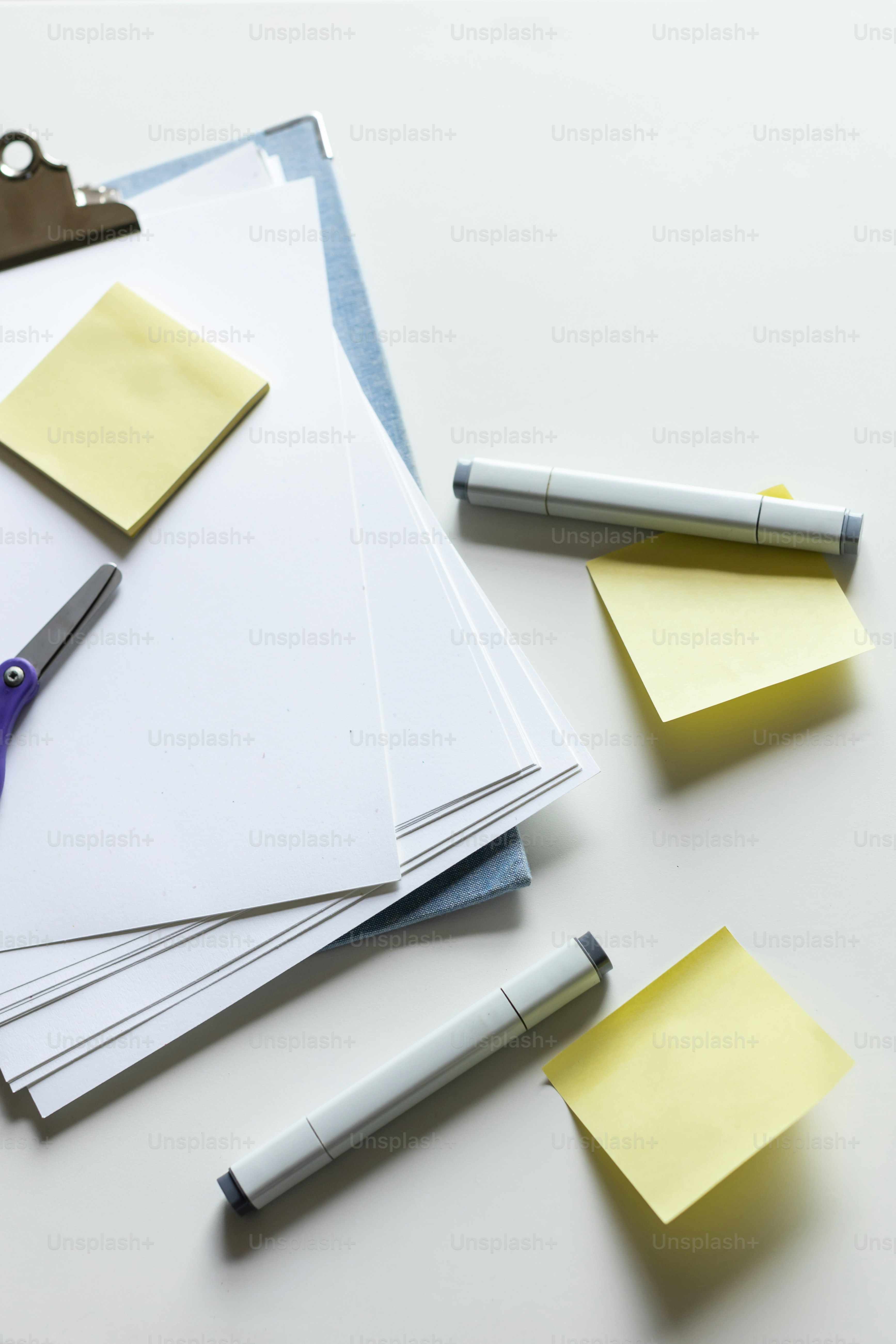 A pile of post it notes and a pair of scissors photo – Pens Image on ...