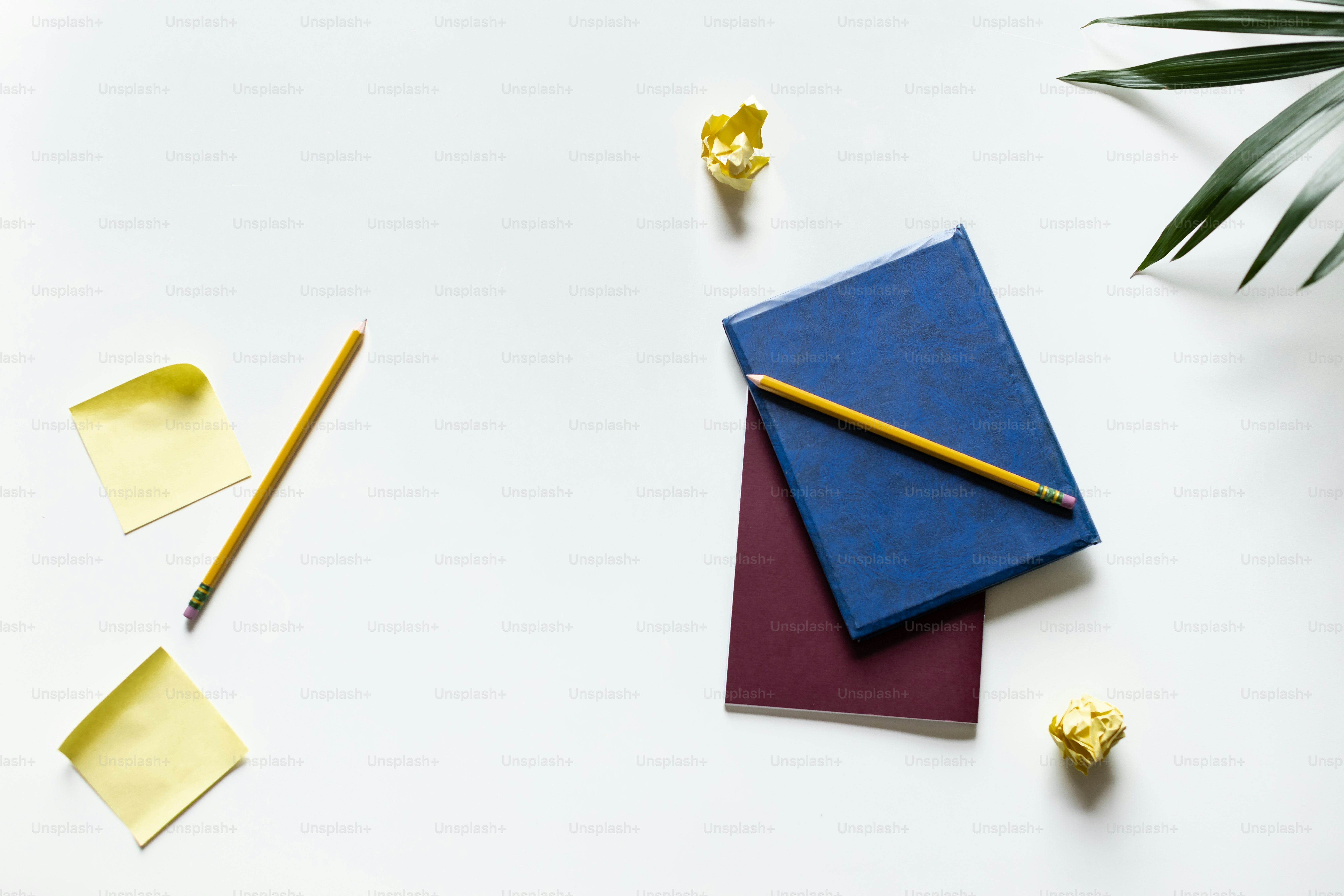 A notebook, pencil, and eraser on a white surface photo – Journal Image ...