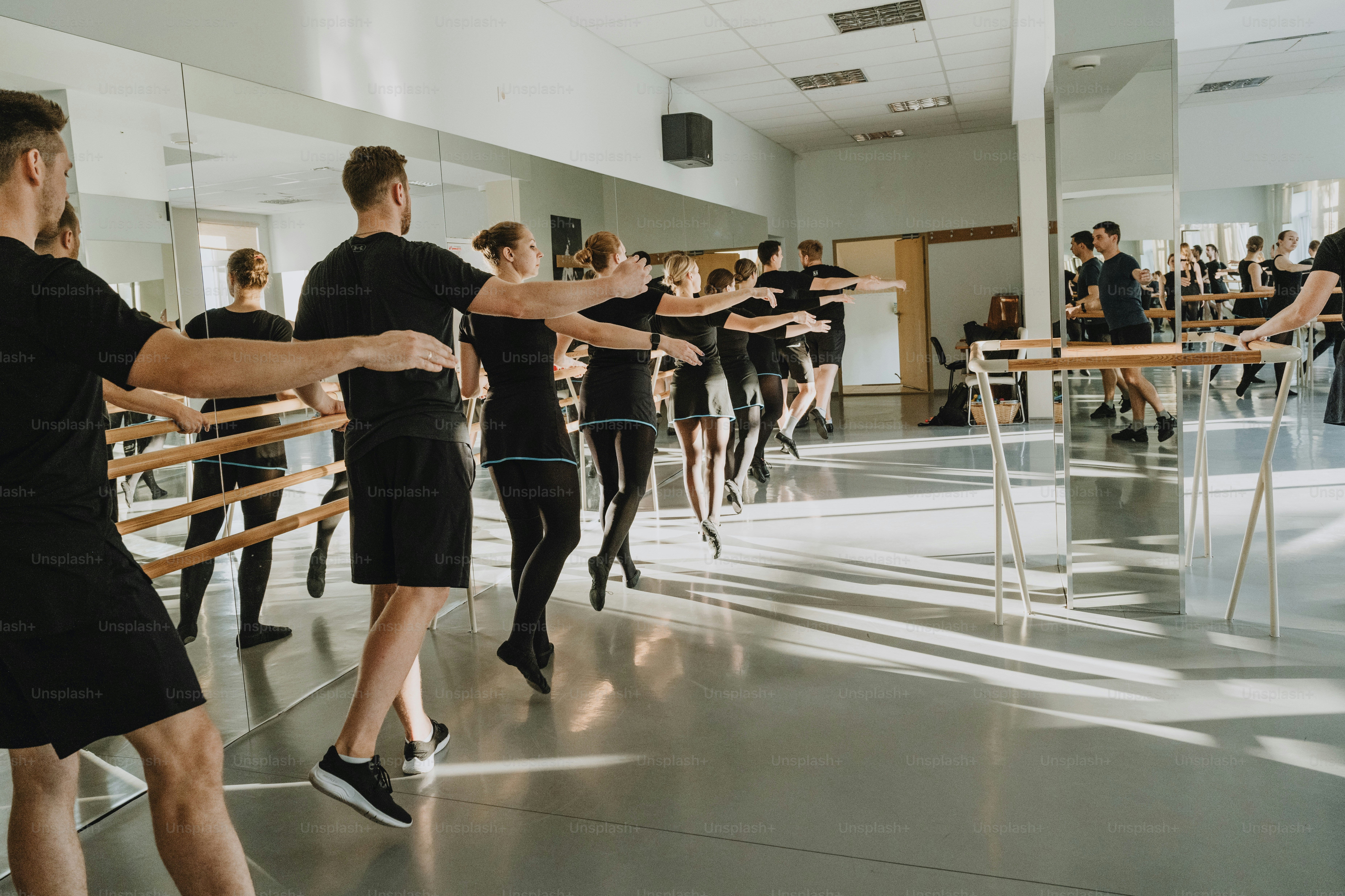 A group of dancers practicing in a dance studio photo – People dancing ...