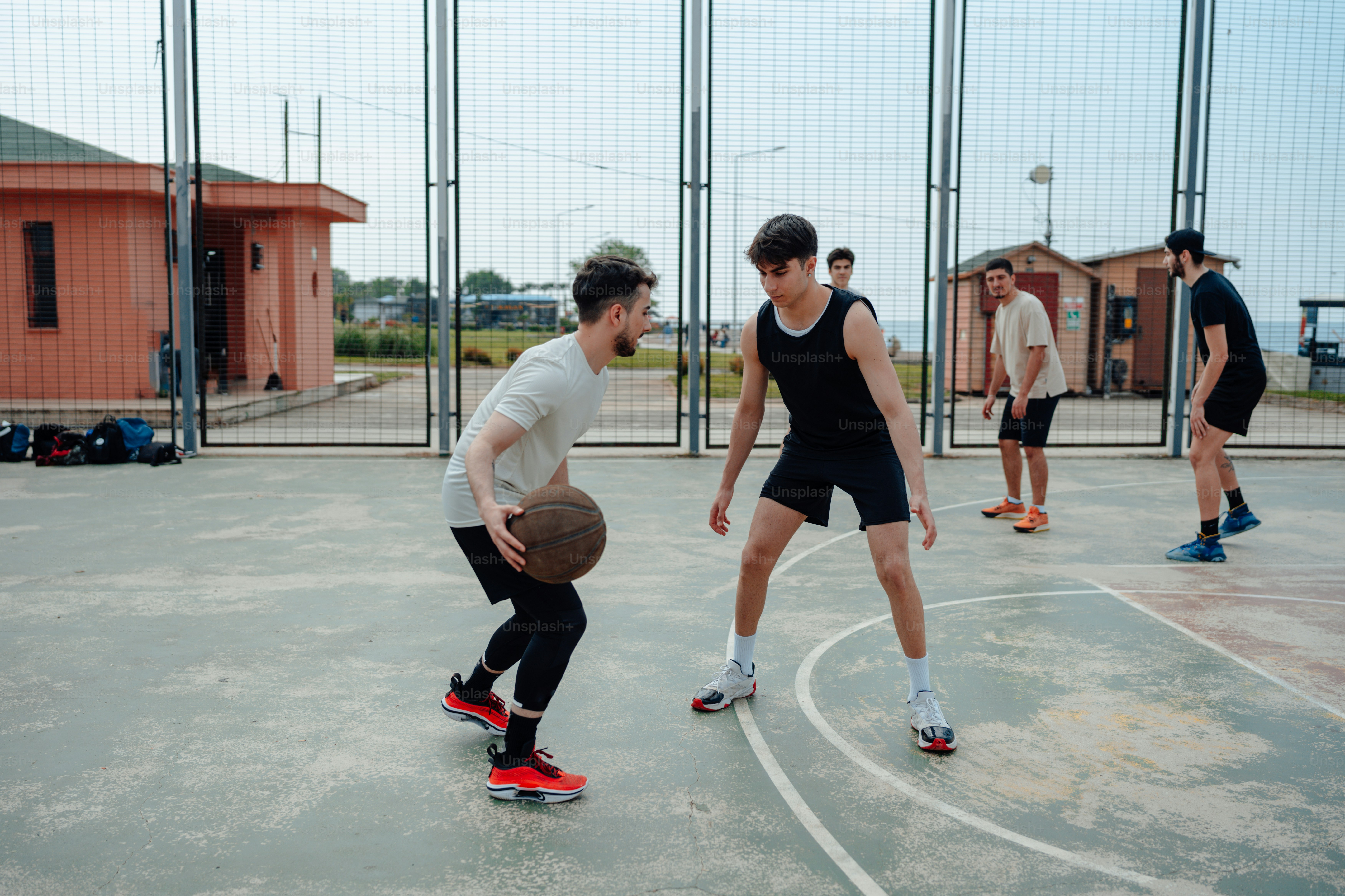A man jumping up to dunk a basketball photo – Team Image on Unsplash