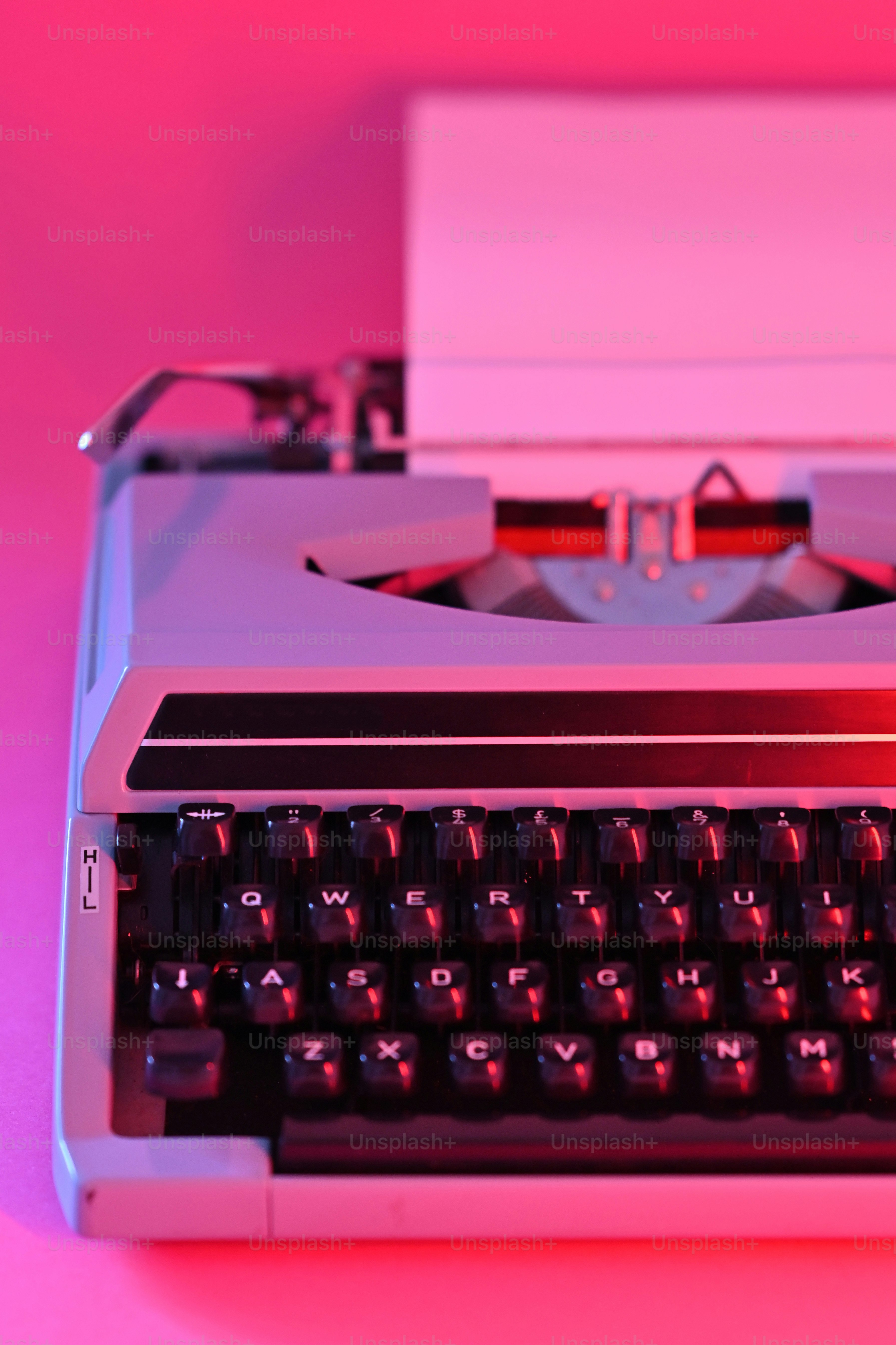 A close up of an old fashioned typewriter photo – 1980s Image on Unsplash