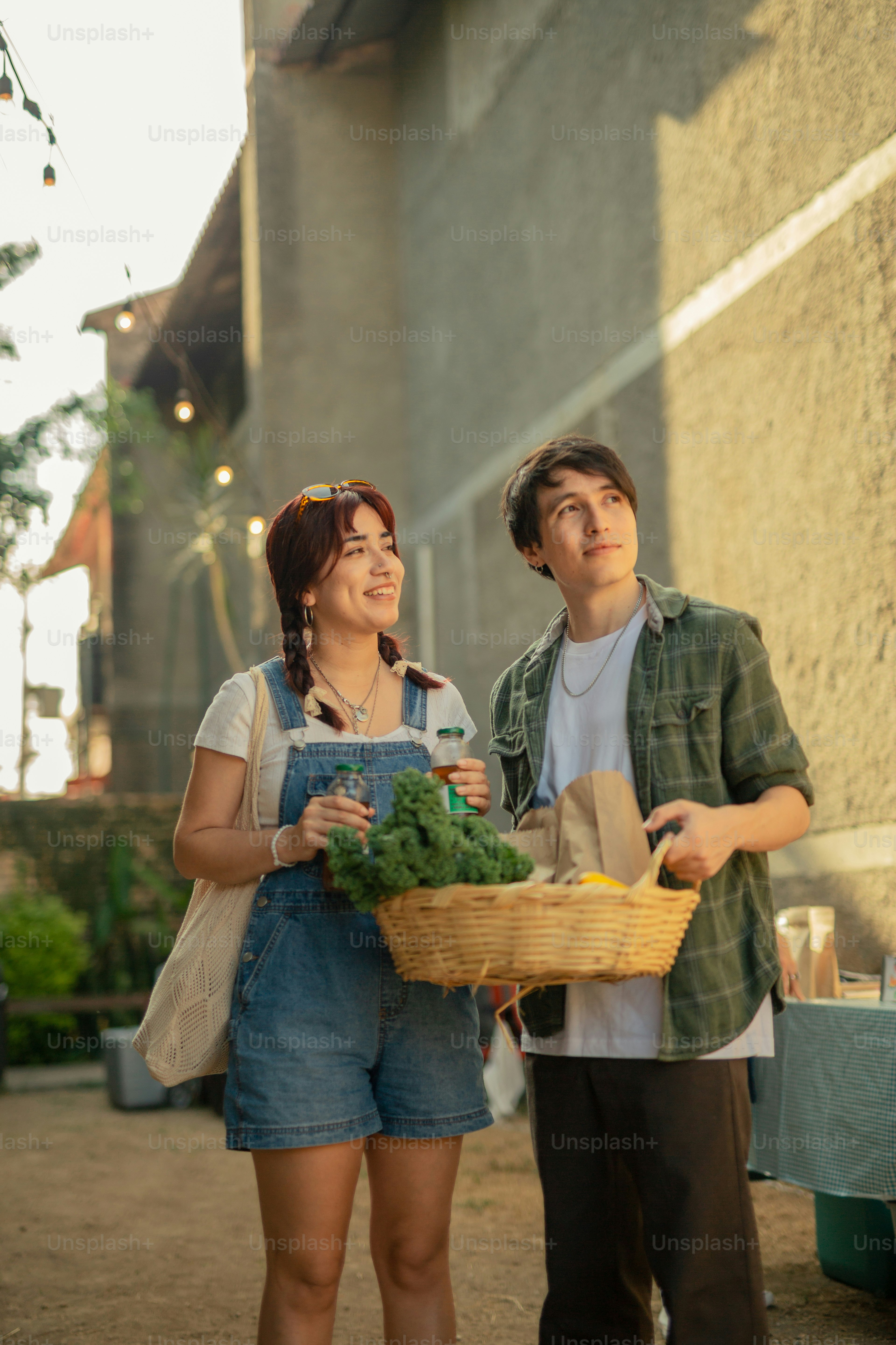 A person holding a basket full of vegetables photo – Shop local Image ...
