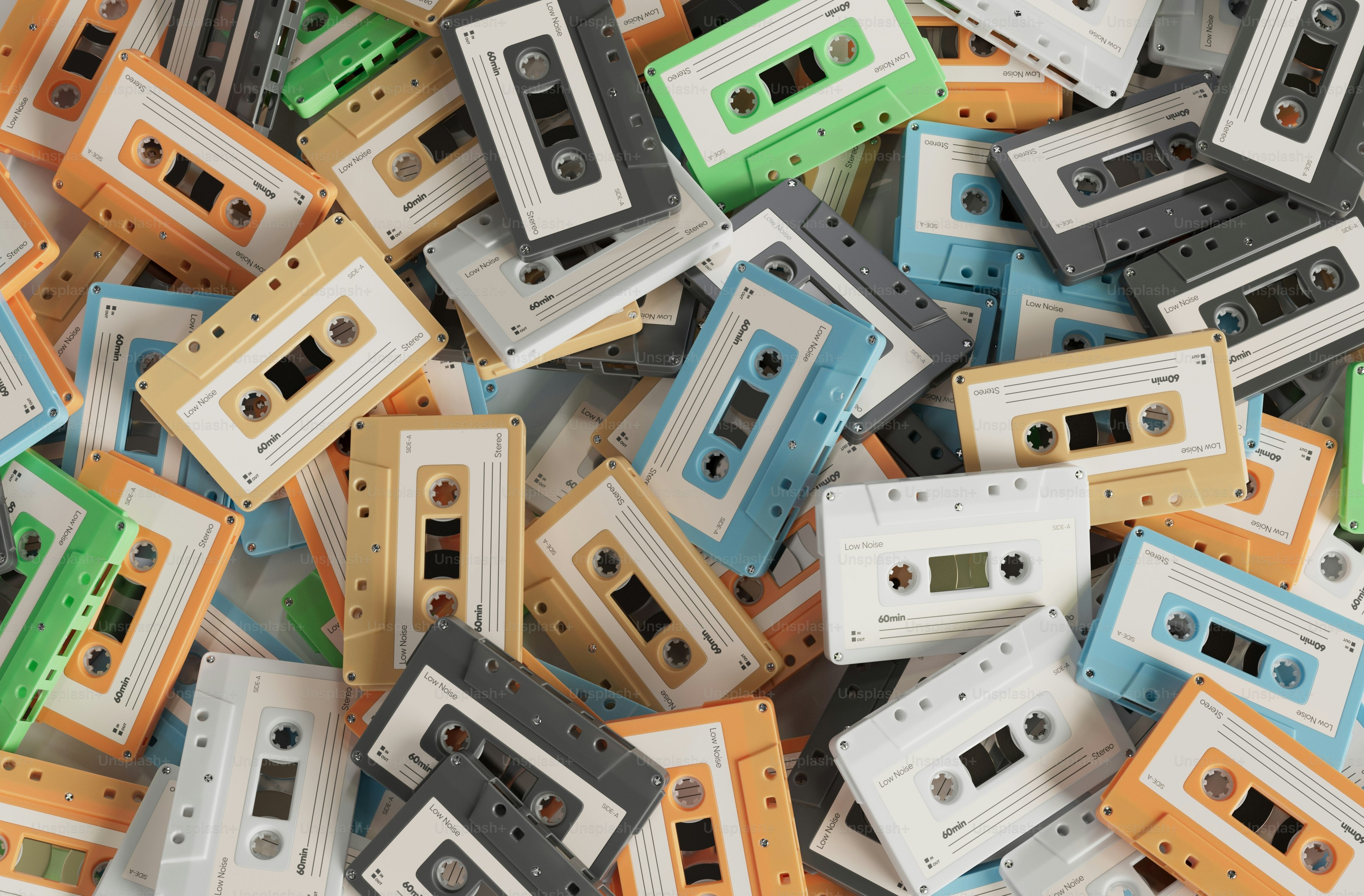 A pile of colorful cassettes sitting next to each other photo – Vintage ...