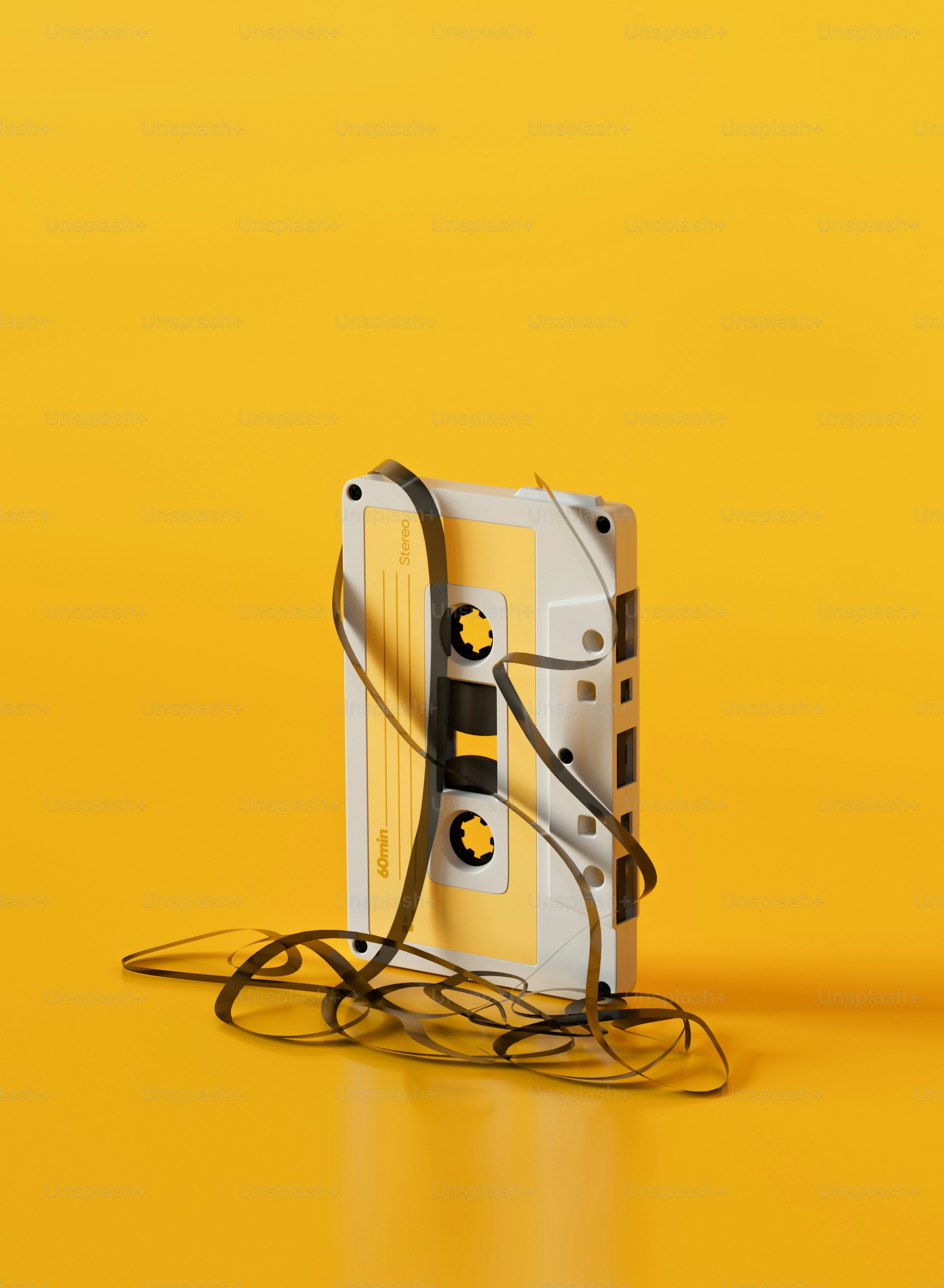 A tape recorder with a cord attached to it photo – Digital image Image ...