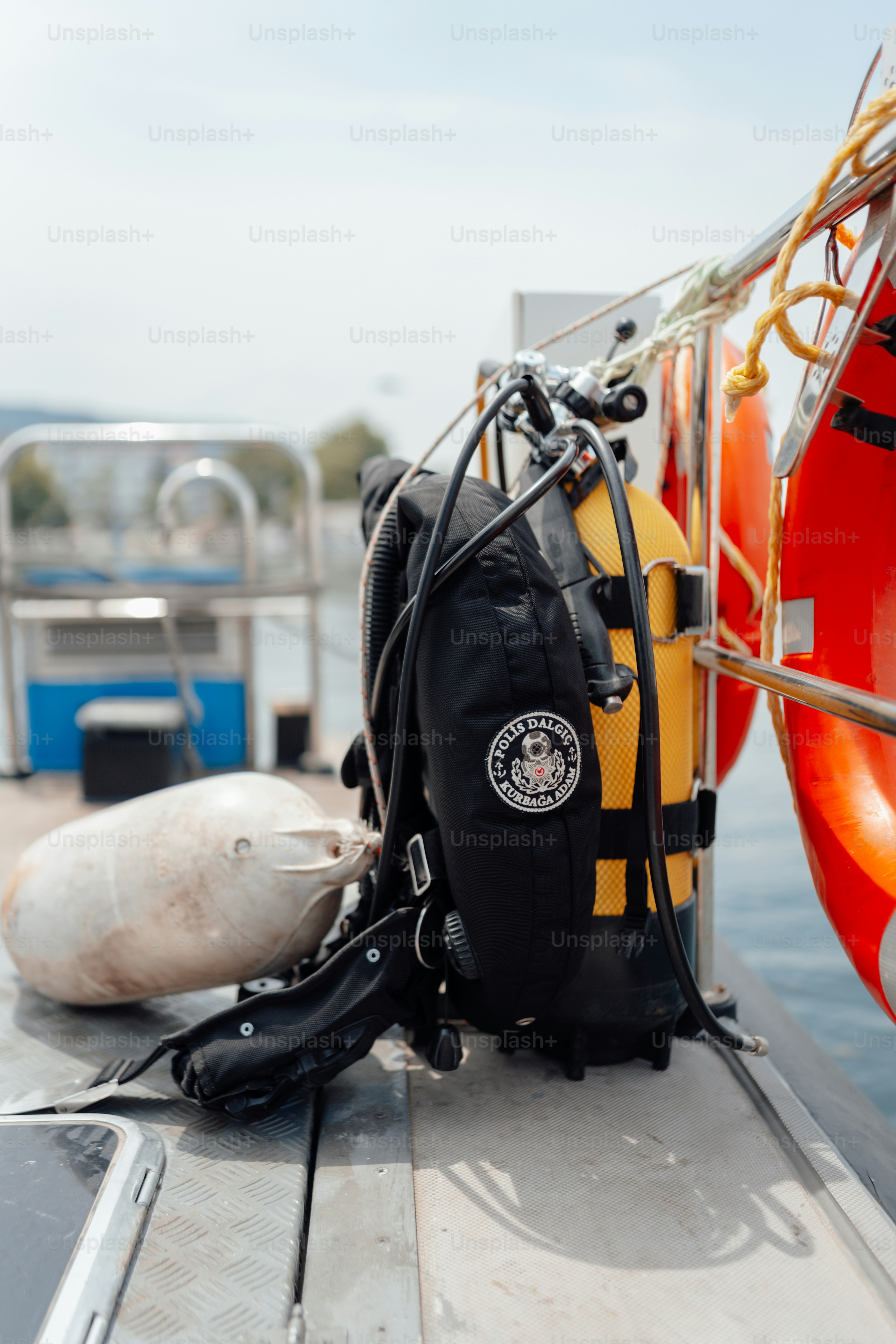 A life preserver and a life preserver on a boat photo – Marine police ...