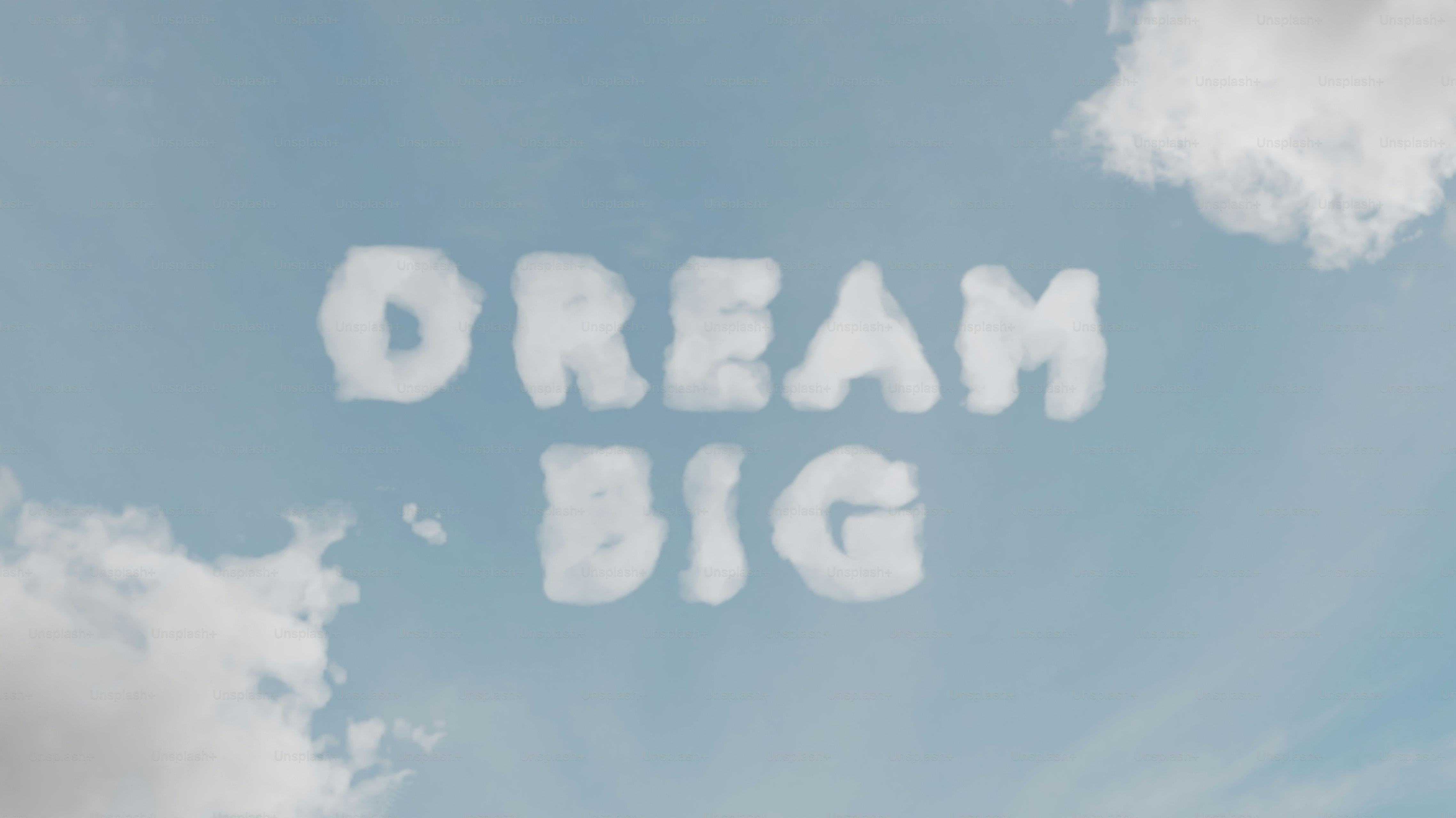 The words dream big written in the sky photo – Motivational quotes ...