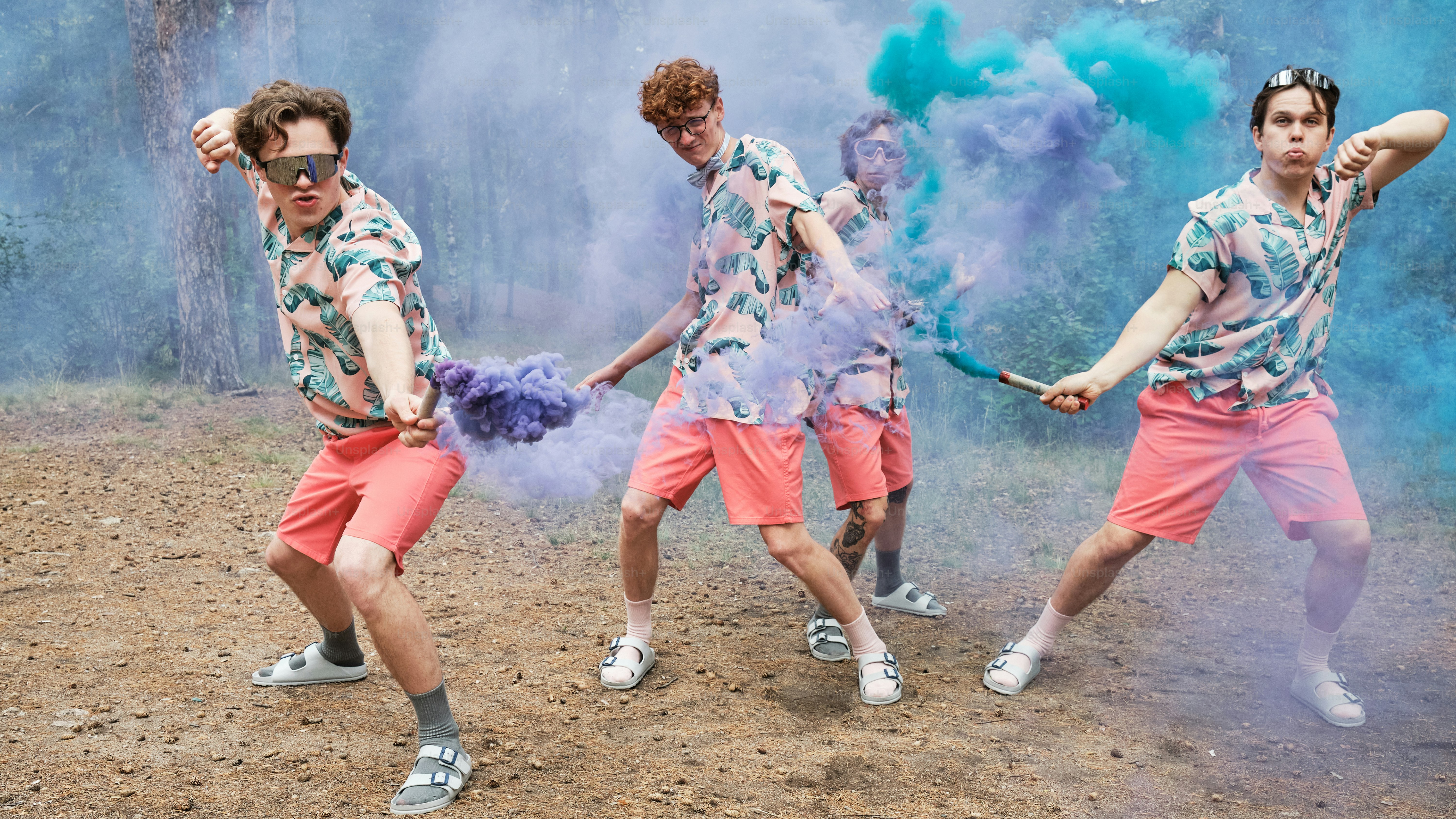 A group of young men playing a game of tug of war photo – Outdoor party ...