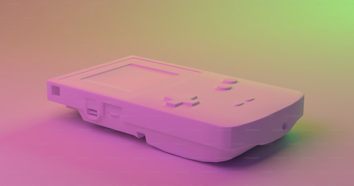 테이블 위에 앉아 있는 분홍색 닌텐도 Wii 게임 컨트롤러 사진 Unsplash의 닌텐도 이미지