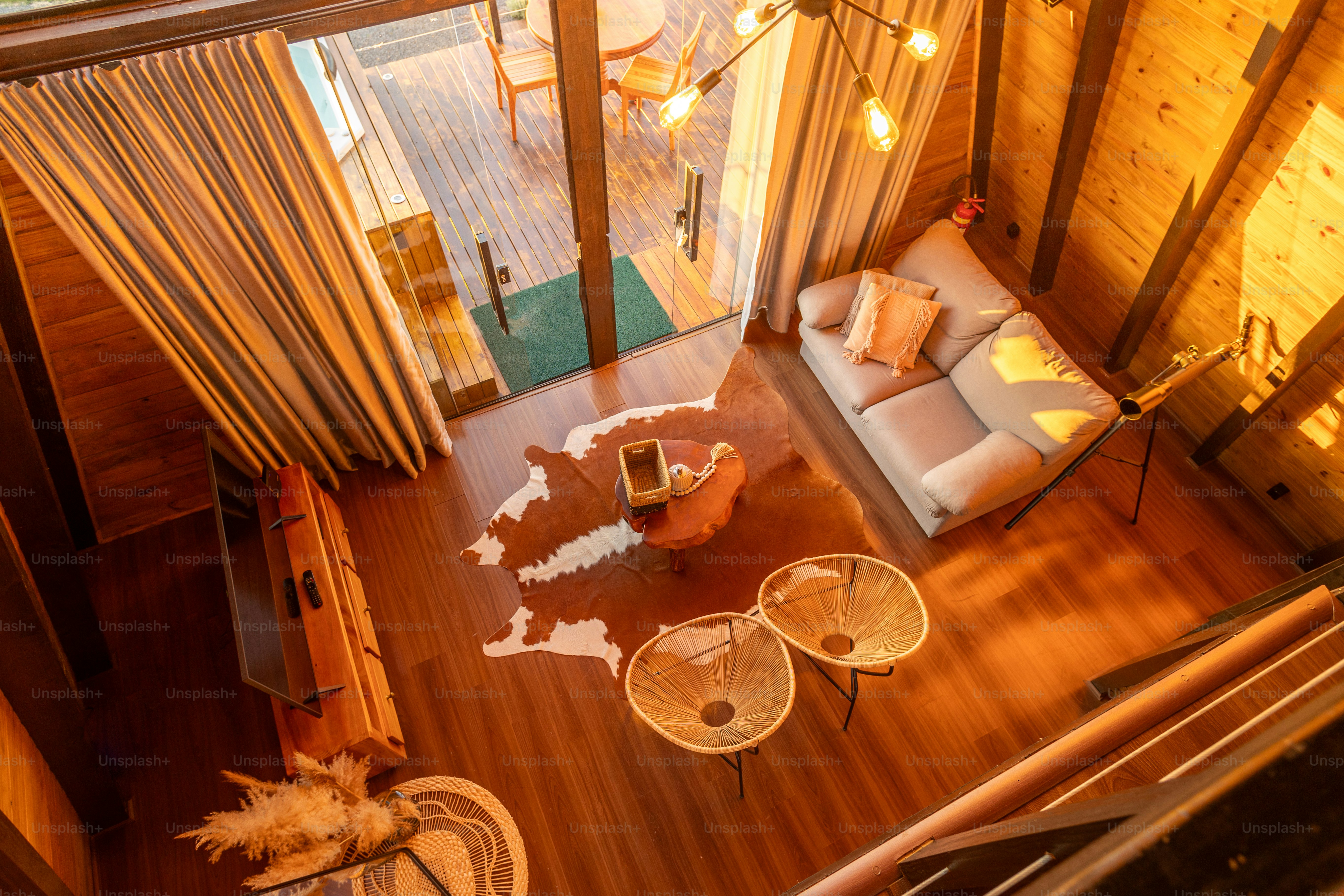 A view of a living room from above photo – Rental Image on Unsplash