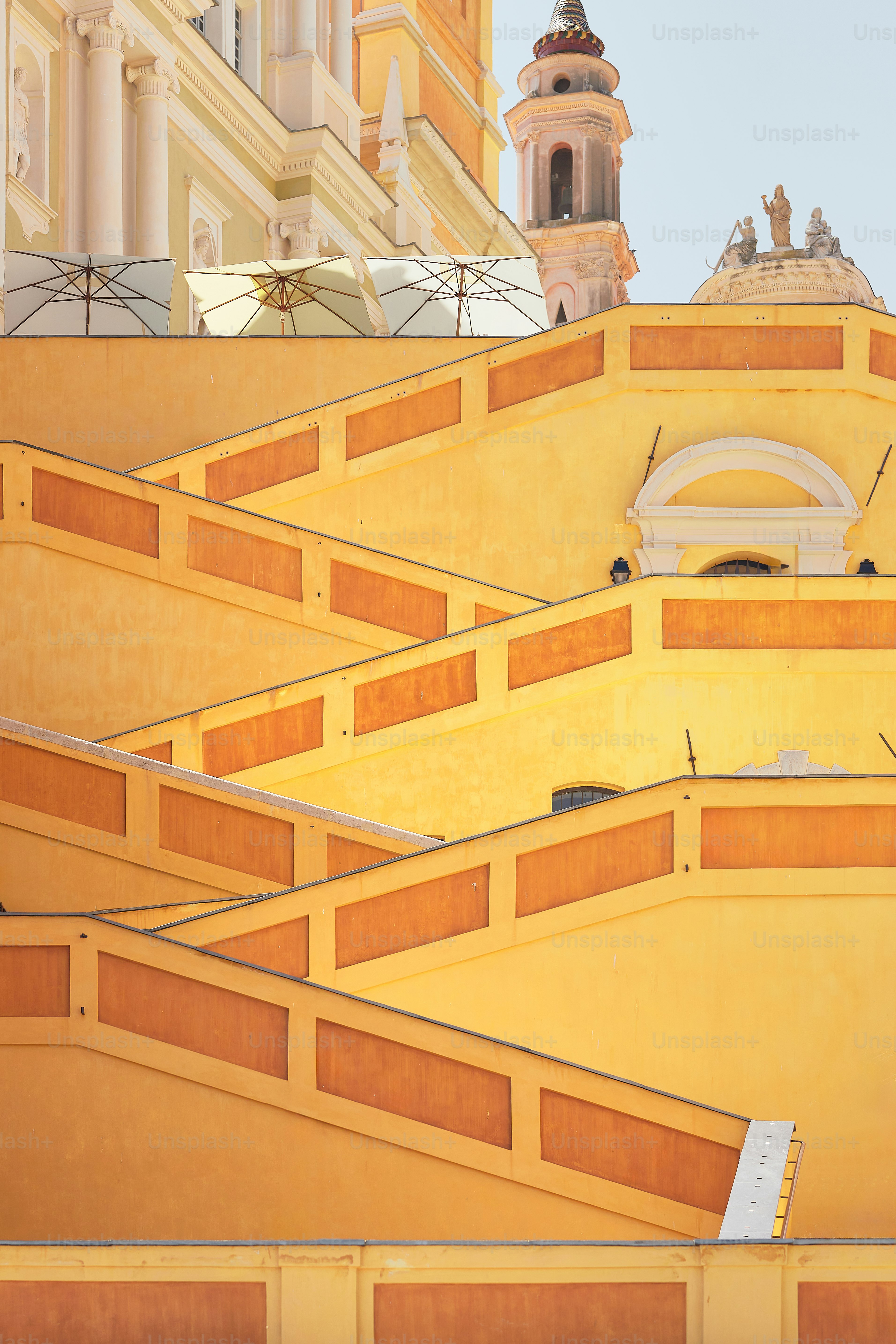 A narrow city street lined with tall buildings photo – France Image on ...