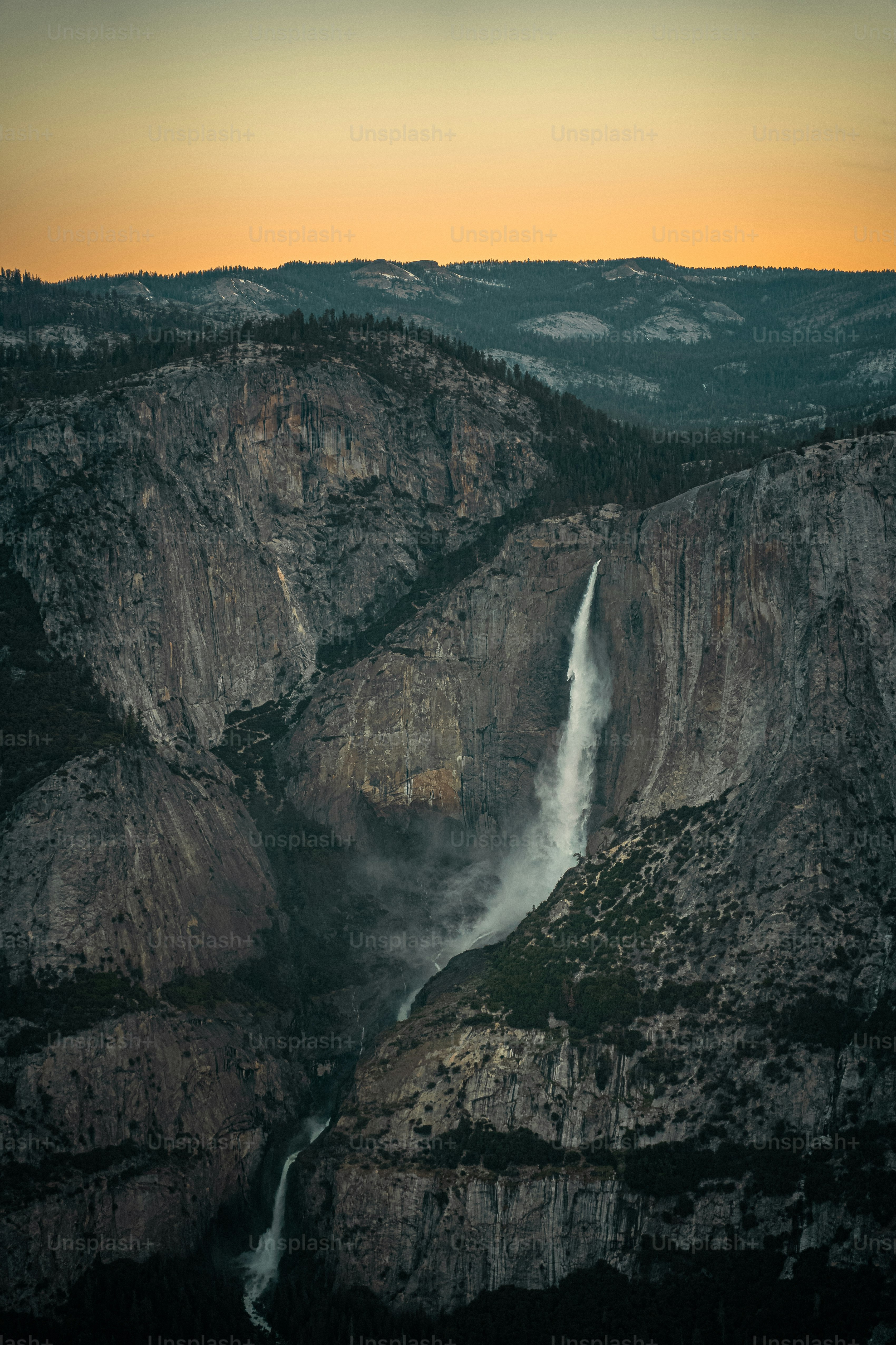 A view of a waterfall from a high point of view photo – Waterfall Image ...